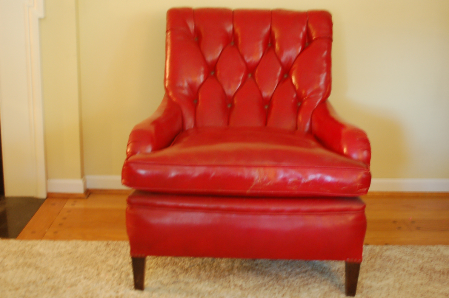 Red Leather Overstuffed Wing Chair | EBTH
