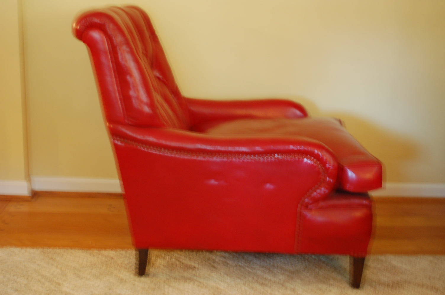 Red Leather Overstuffed Wing Chair | EBTH