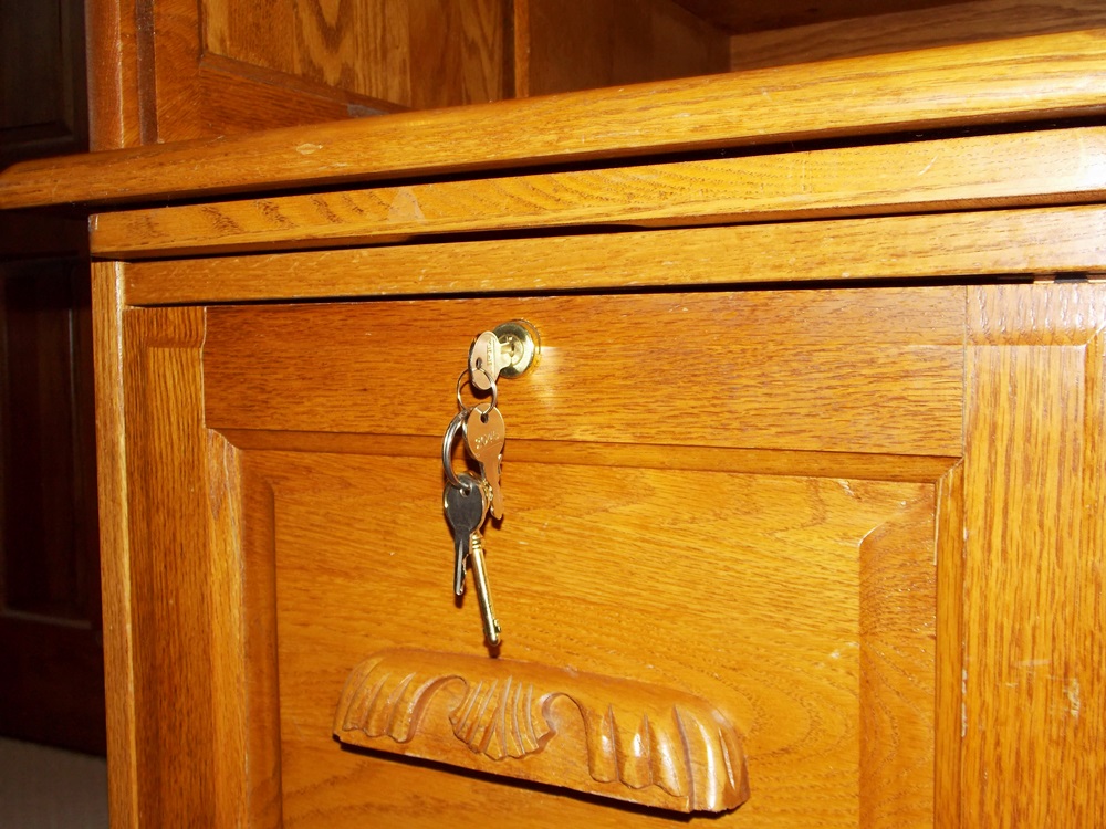 A Solid Oak Roll Top Computer Desk by "Winners Only Inc." | EBTH