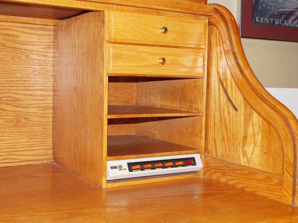 A Solid Oak Roll Top Computer Desk by "Winners Only Inc." | EBTH