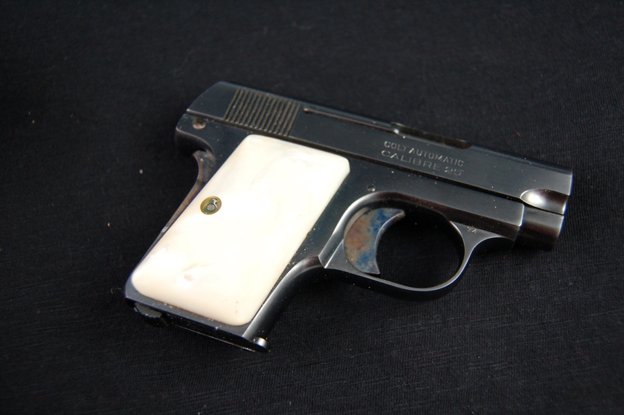 Colt .25 Caliber Pistol with a Mother of Pearl Handle and Holster | EBTH
