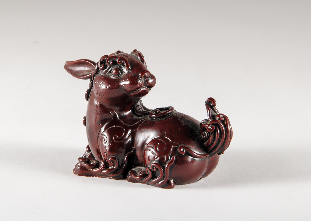 Chinese Red Resin Buddha's and Rabbit Figurines | EBTH