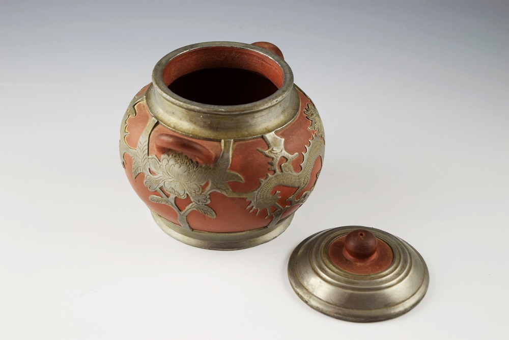 A Yee Dzu Ching Red Clay Pot with Pewter Dragon Overlay | EBTH