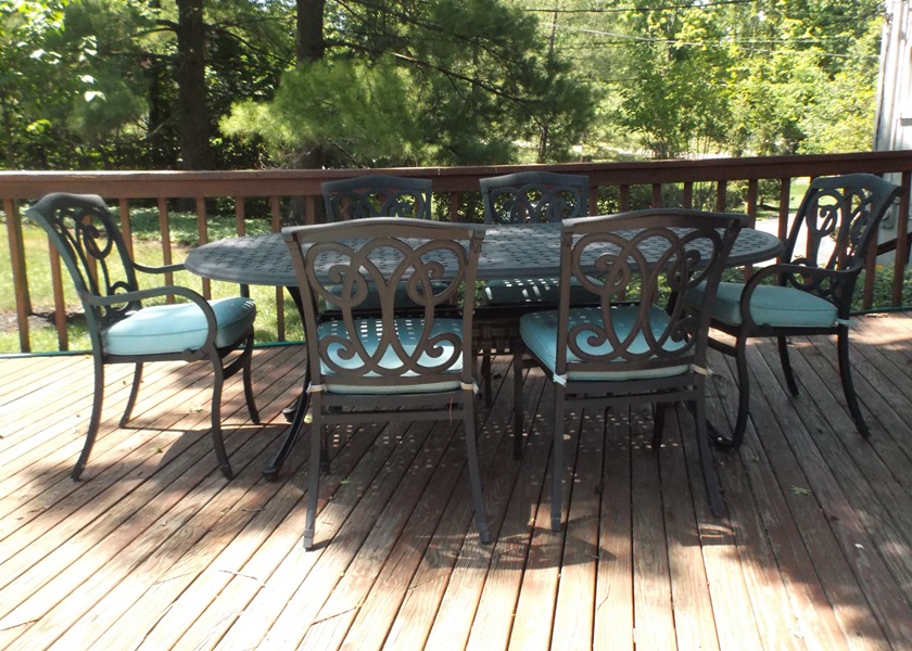 Cast Metal Oval Patio Table and Six Chairs | EBTH