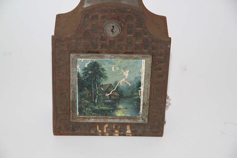 Cast Iron Nickelodeon Coin Box | EBTH