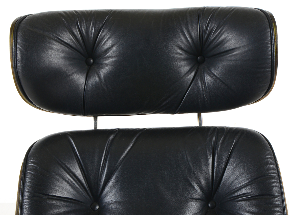 Selig Manufacturing Co. Eames Style Chair and Ottoman | EBTH