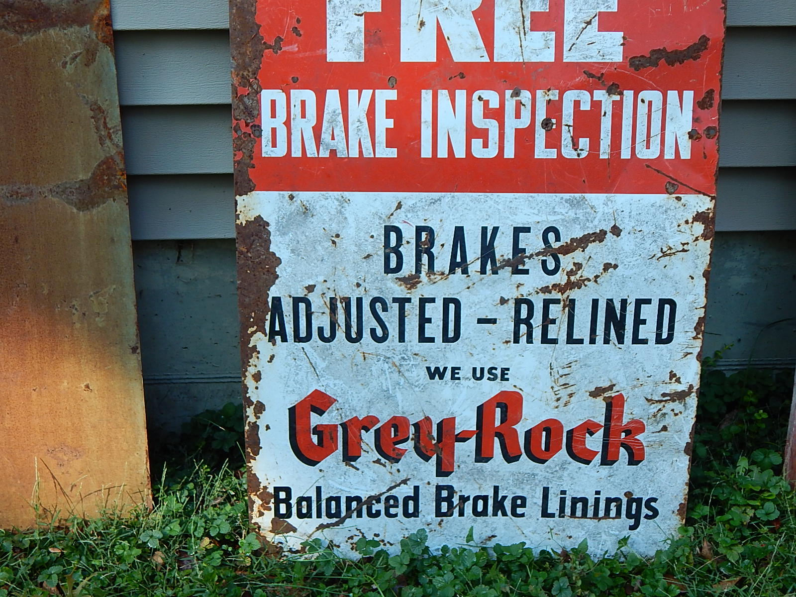 Vintage Grey Rock Brake Lining Advertising Metal Sign | EBTH