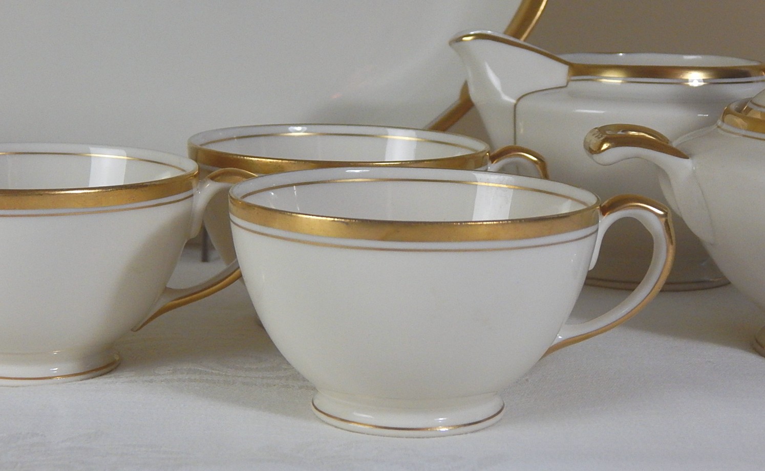 Vintage White and Gold Trimmed Warwick China | EBTH