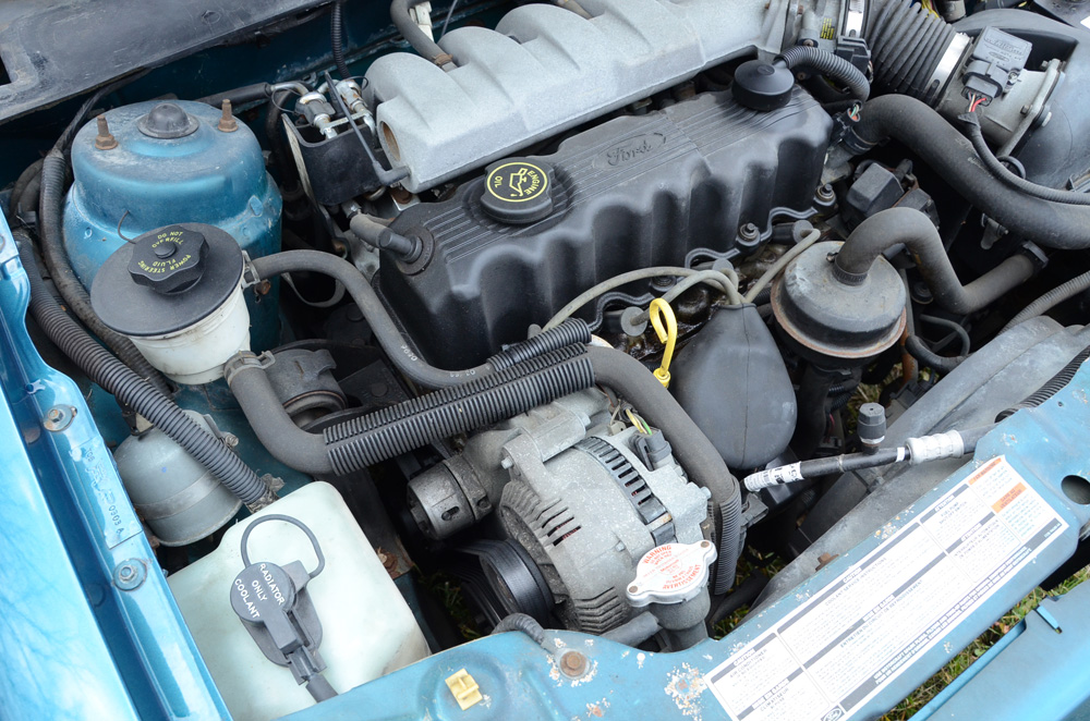 Aqua 1993 Ford Tempo GL Coupe | EBTH