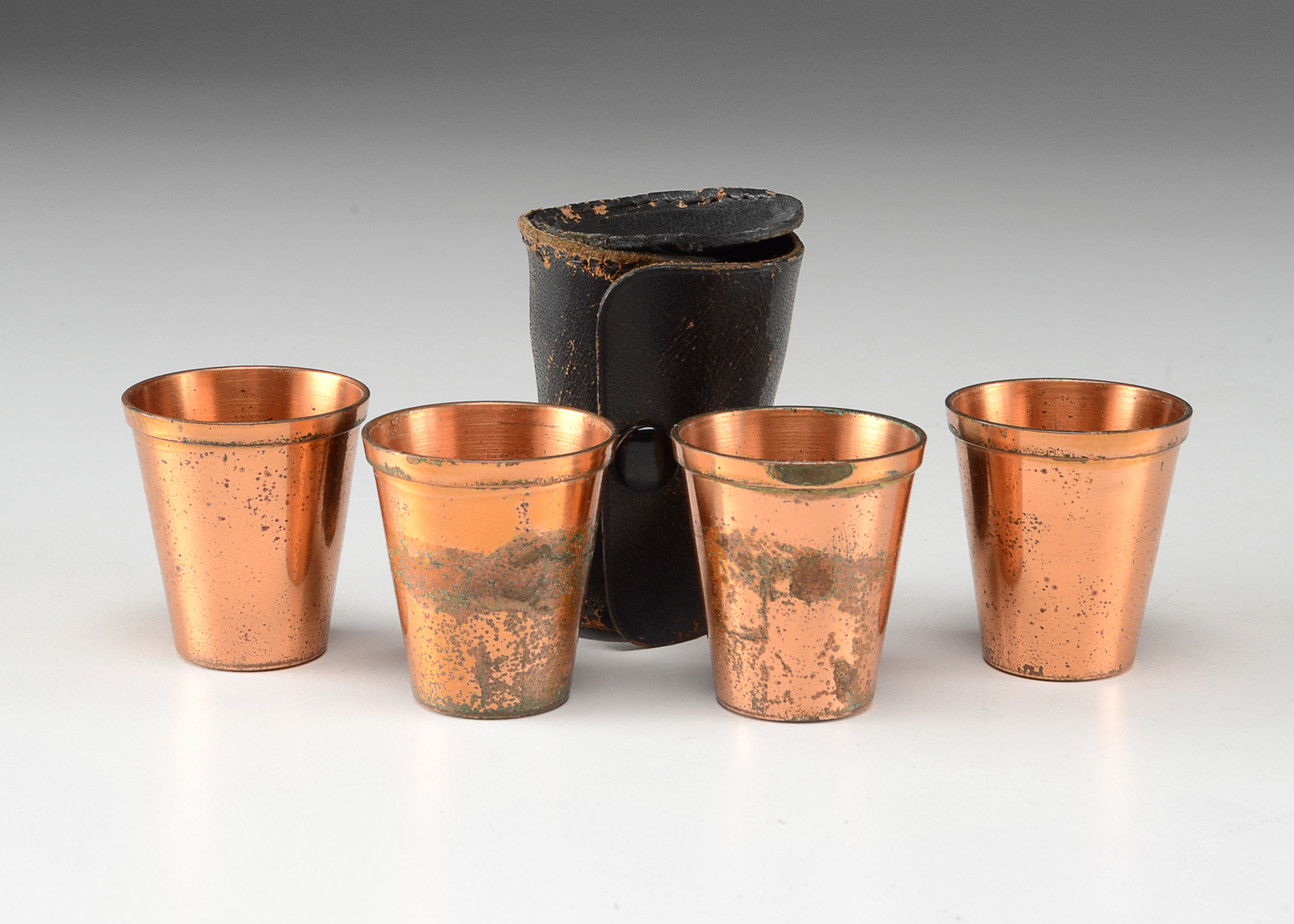 Set of Four Copper Shot Glasses With Leather Case | EBTH