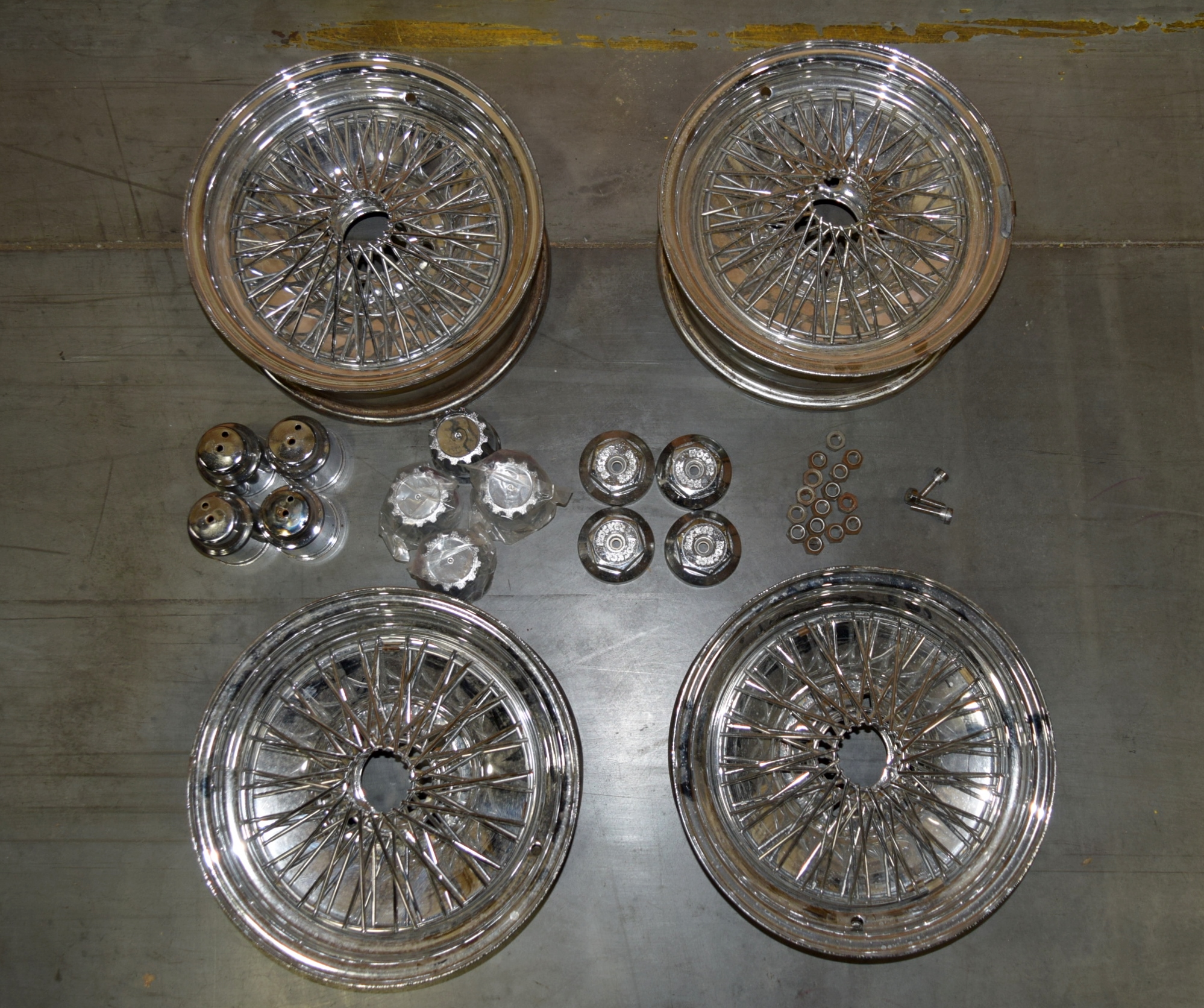 Four Vintage Wire Car Rims by Rocket Road Wheels | EBTH