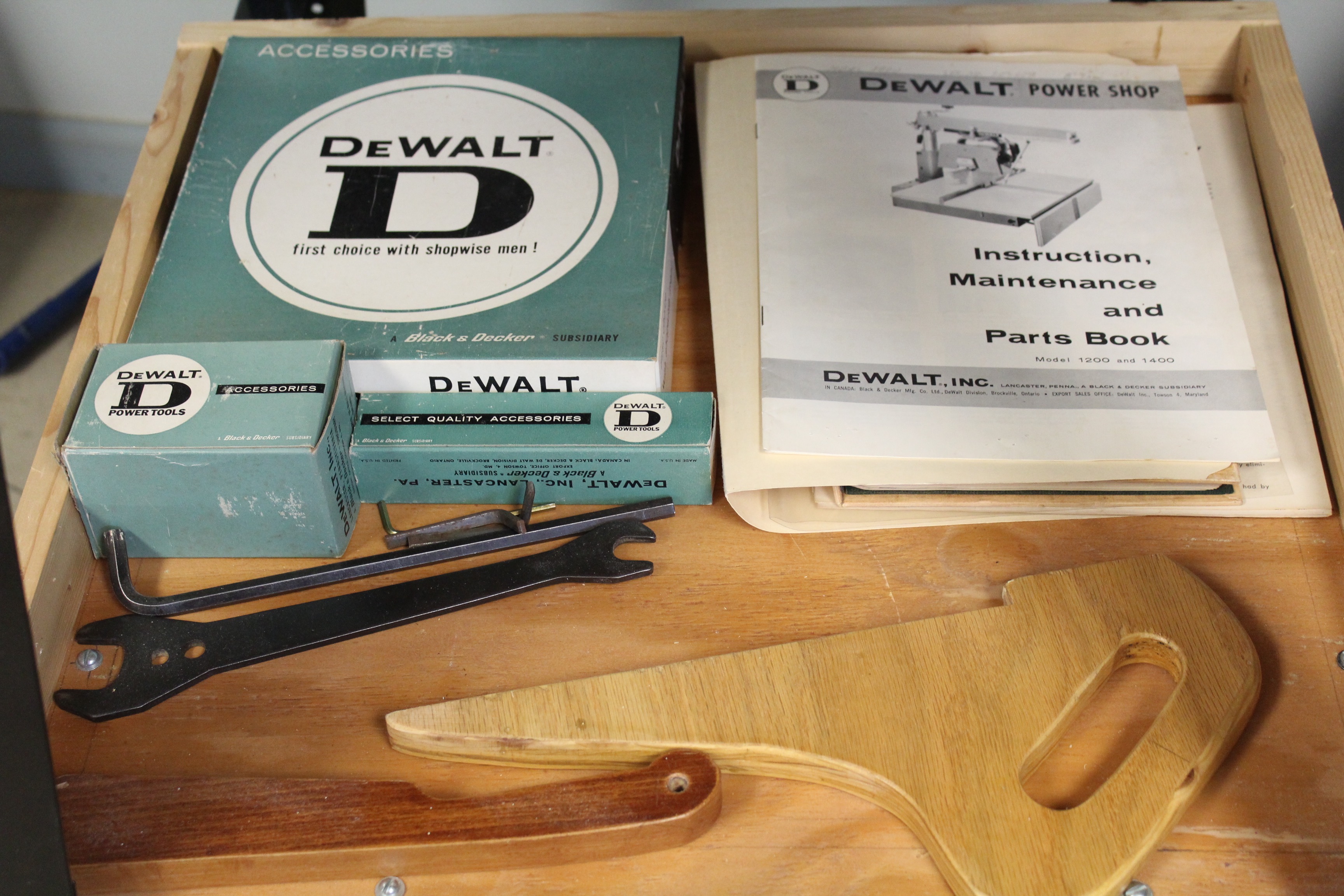 DeWalt Power Shop Radial Arm Saw on Stand and Wall of Blades | EBTH