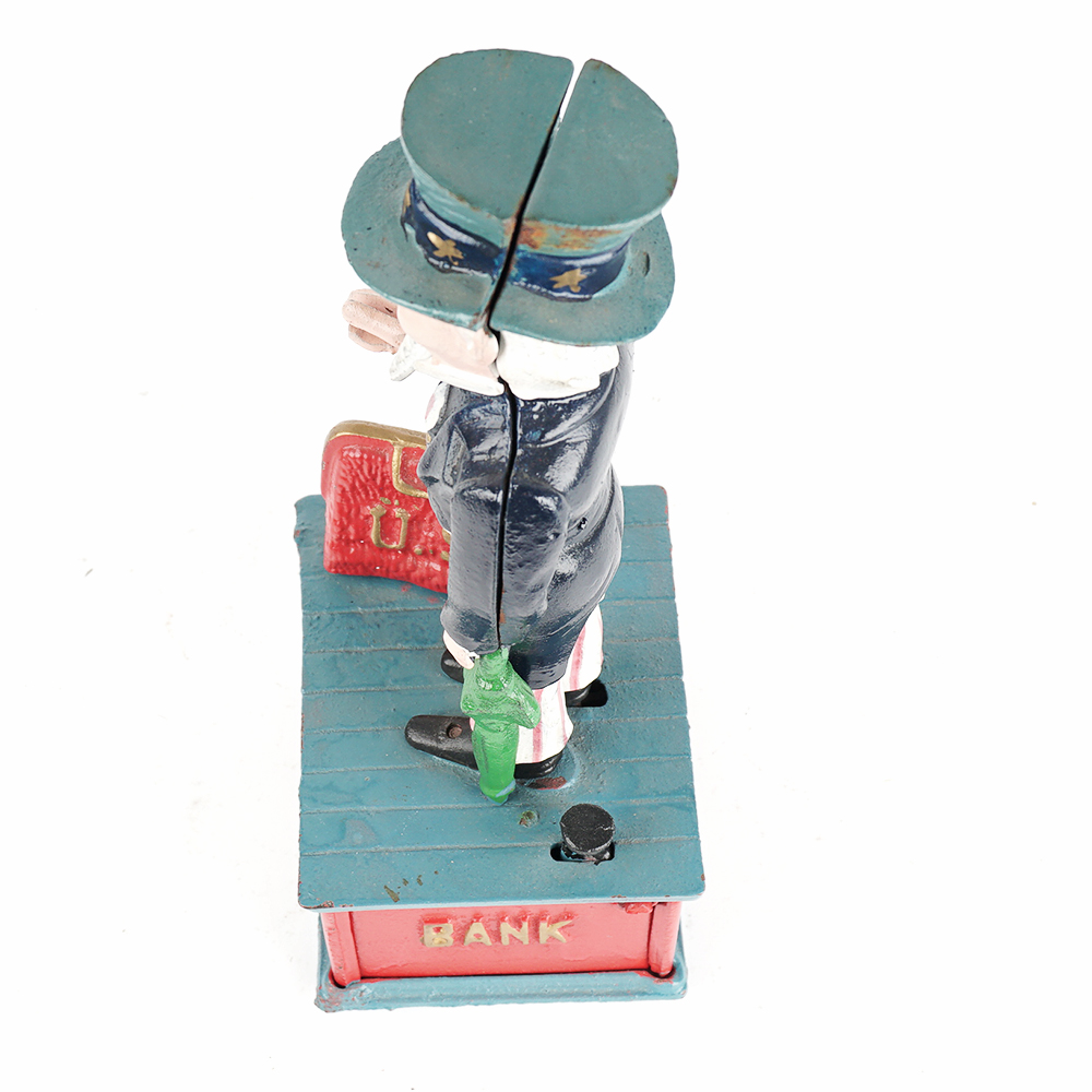 Uncle Sam Cast Metal Coin Bank | EBTH