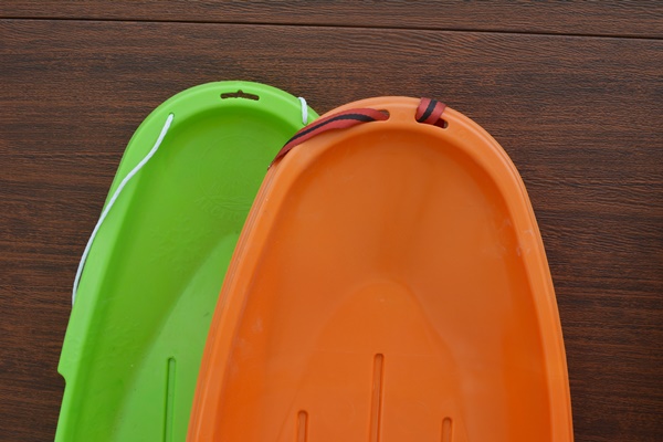 K2 Fat Bob Snow Board and Two Plastic Sleds | EBTH