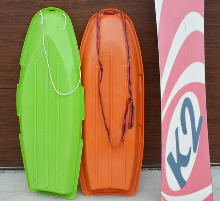 K2 Fat Bob Snow Board and Two Plastic Sleds | EBTH