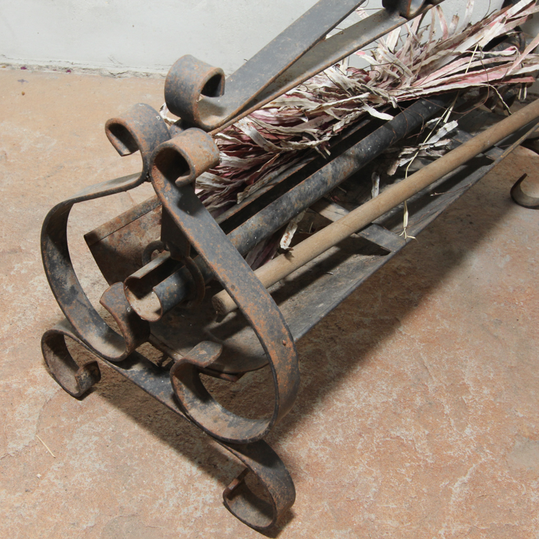 Cast Iron Newspaper Log Roller | EBTH