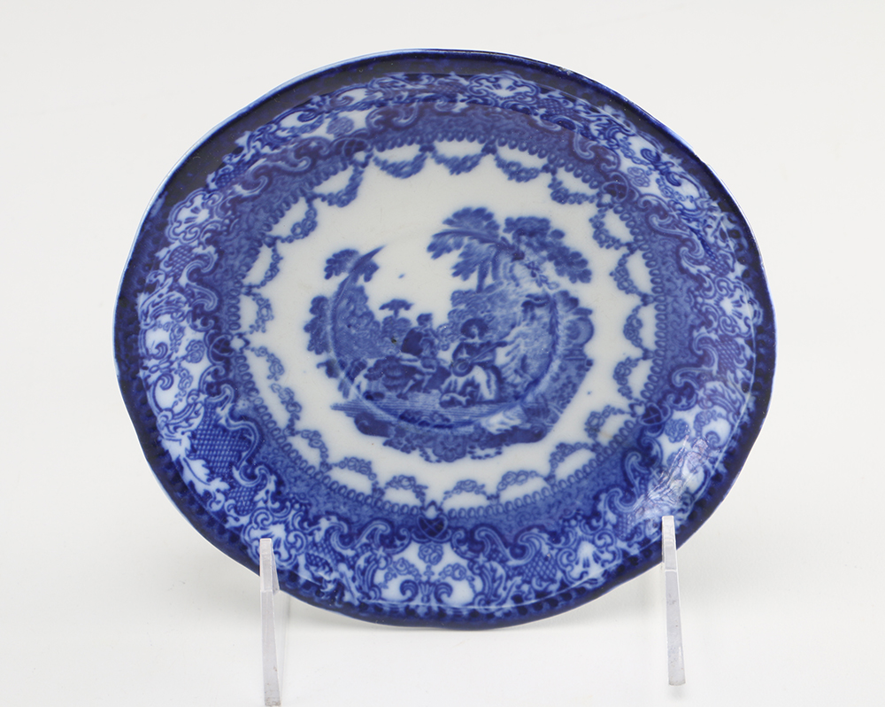 Flow Blue Plates and a Miniature Tea Set | EBTH