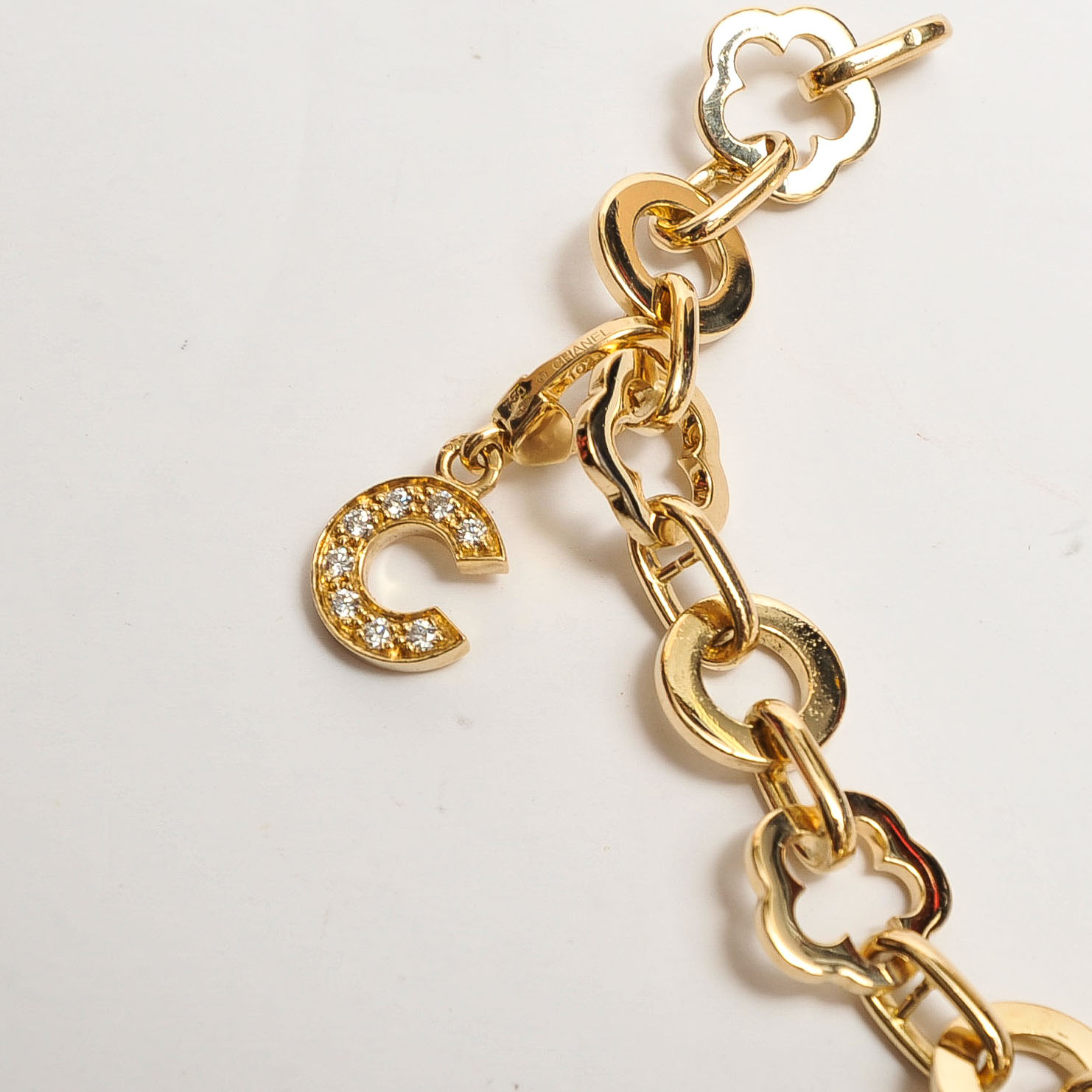 Chanel 18K Yellow Gold and Diamond Charm Bracelet | EBTH