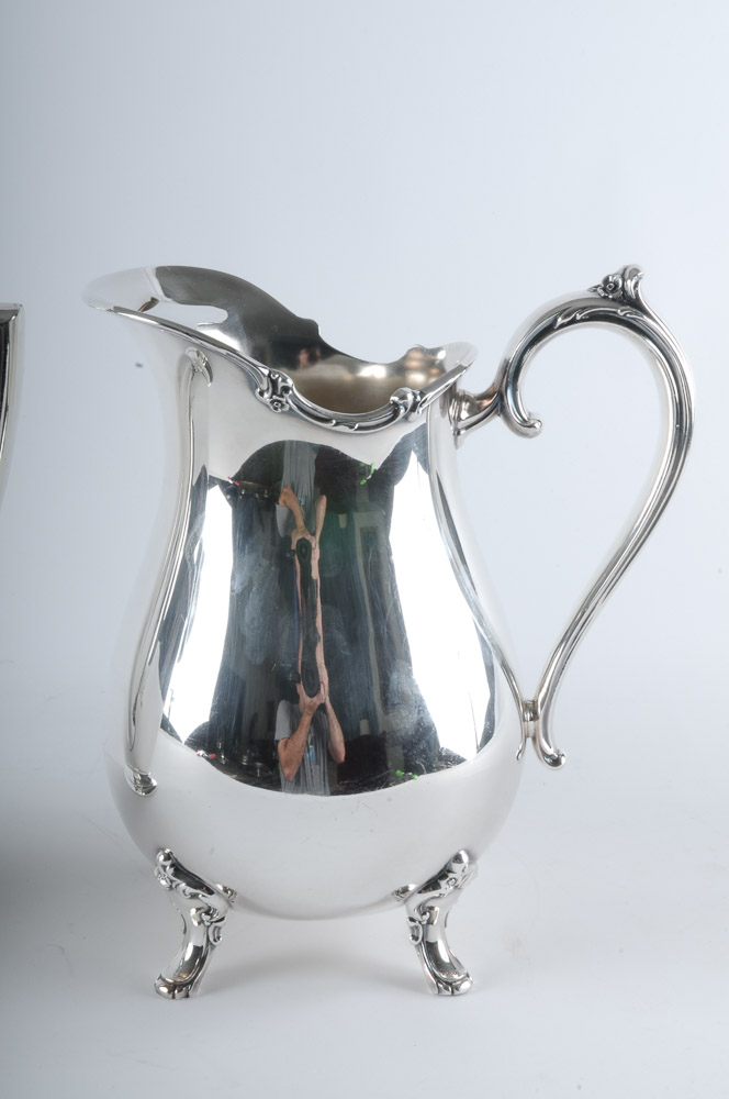 Pair of Silver Plated Pitchers | EBTH