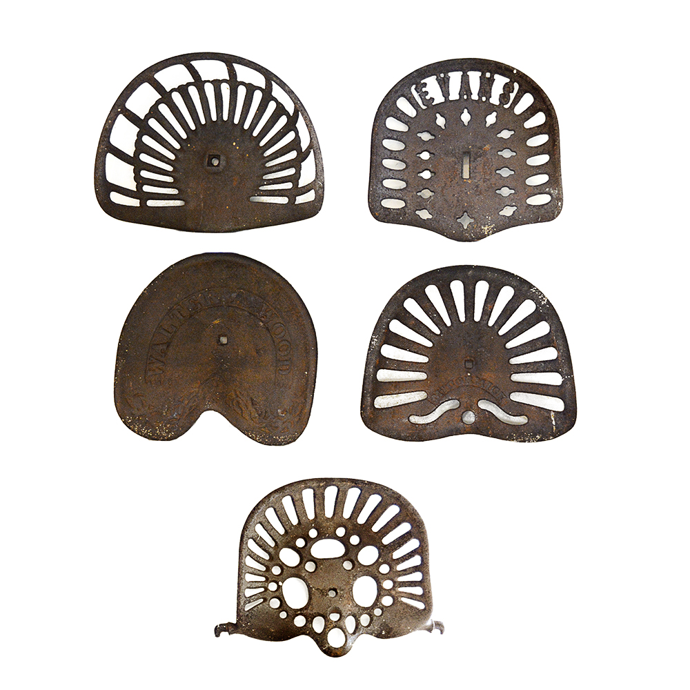 Five Vintage Cast Iron Tractor Seats | EBTH