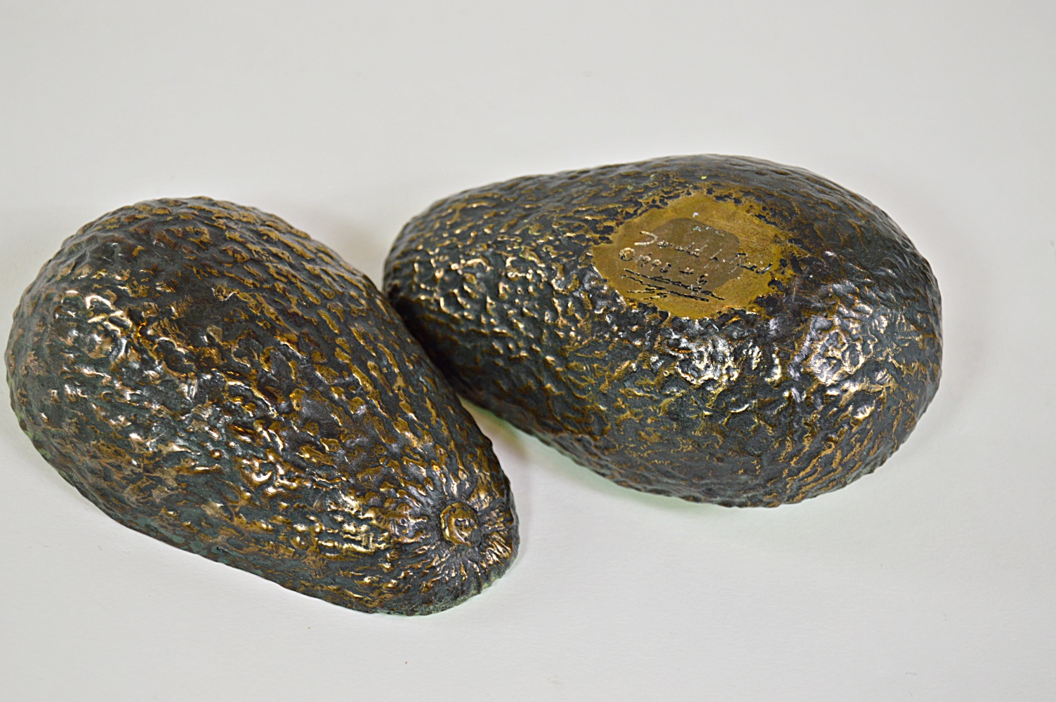 Donald Reed Bronze Sculpture of a Cut Avocado | EBTH