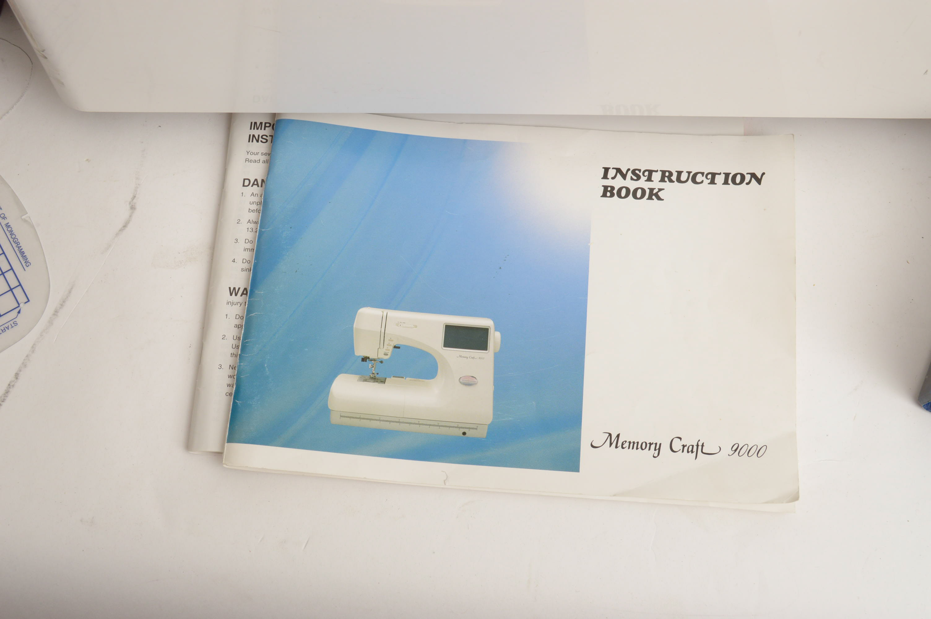 Janome Memory Craft 9000 Sewing Machine and Accessories | EBTH