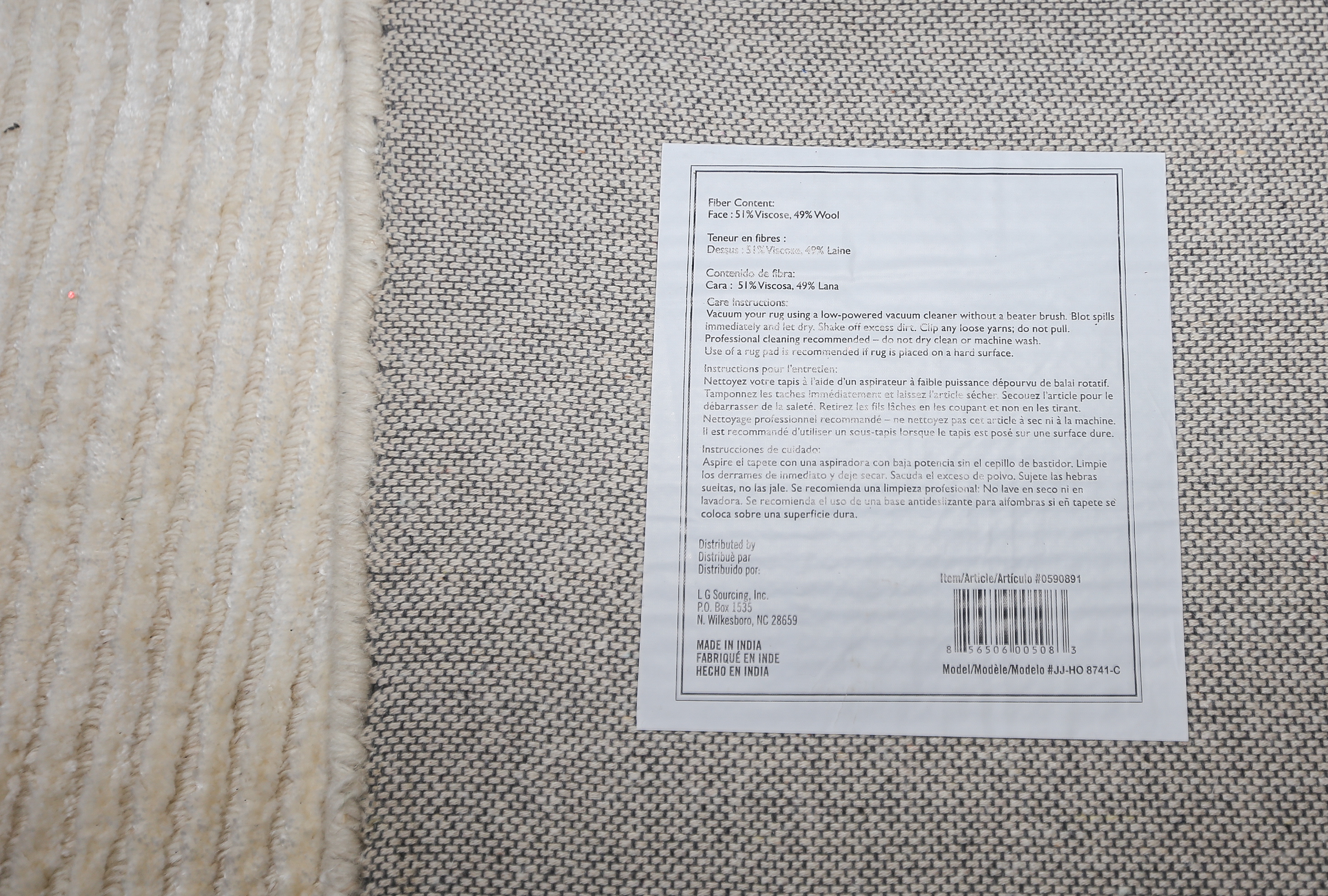 LG Sourcing Cream Area Rug | EBTH