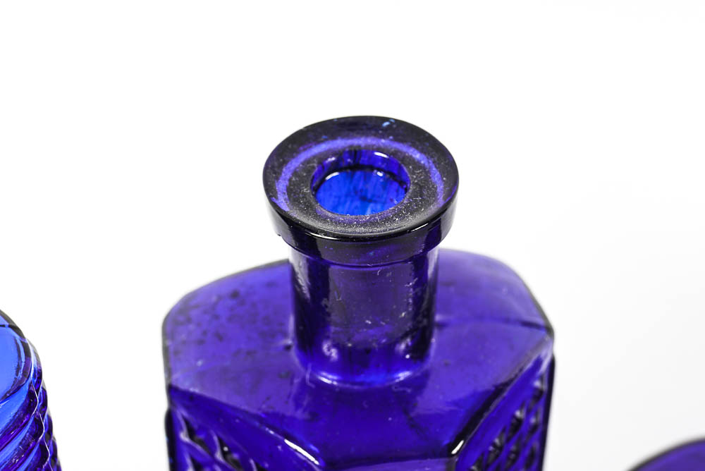 Set of Three Antique Blue Glass Bottles | EBTH