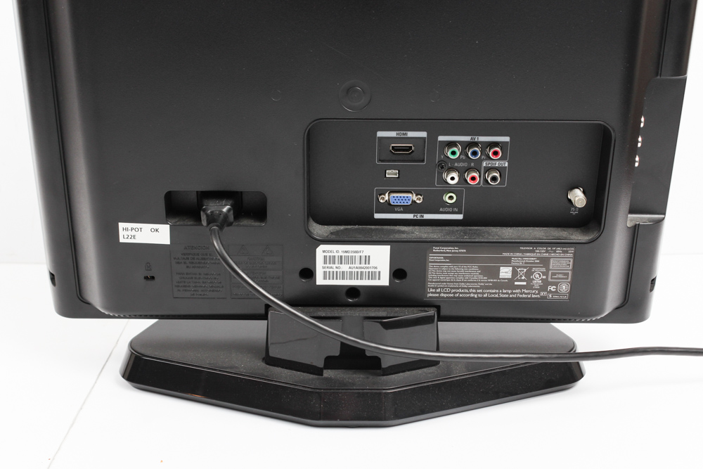 Magnavox Flat Screen Television/DVD Player and DVD Collection | EBTH