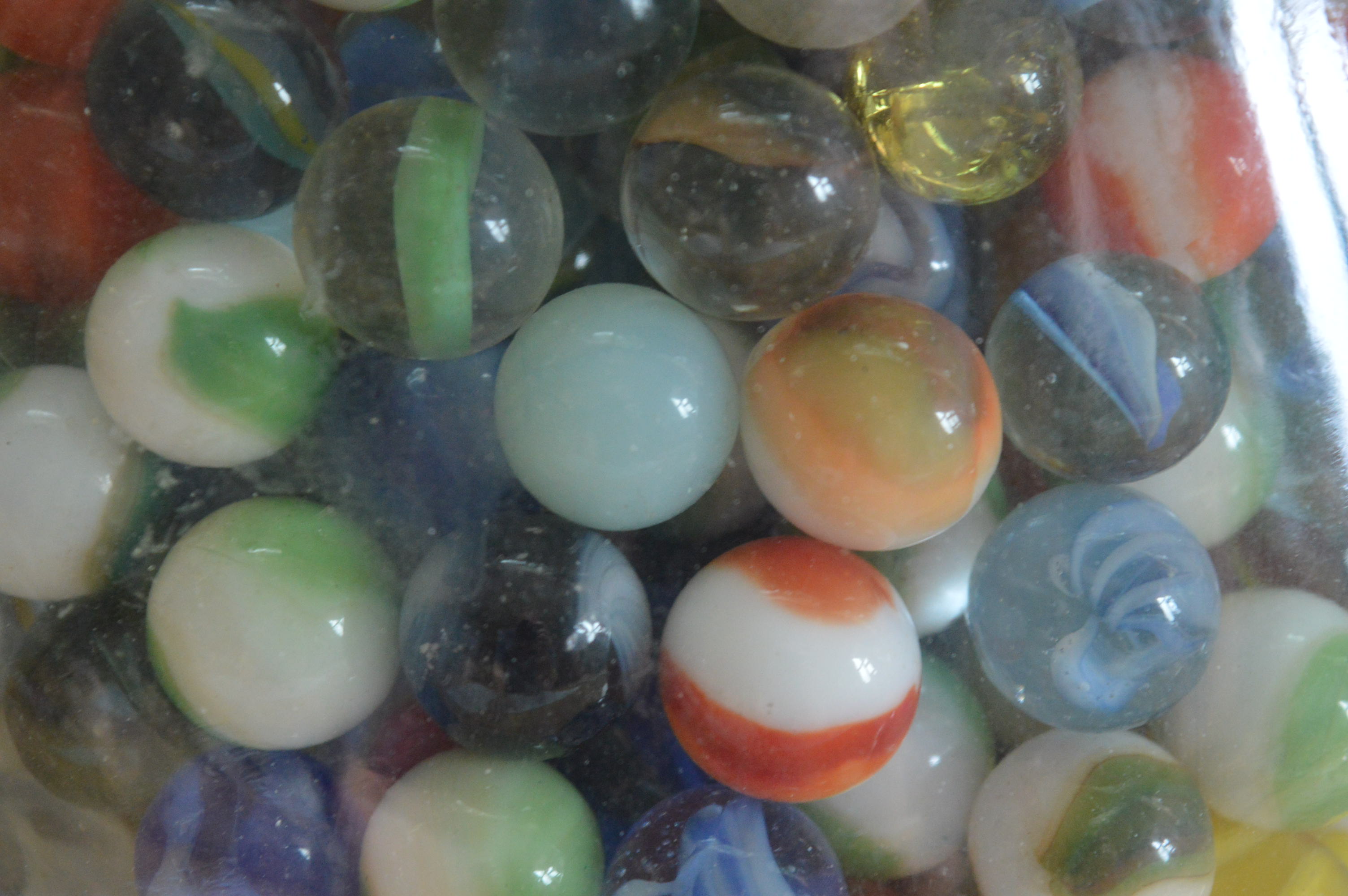 Jug of Marbles Featuring Antique Clay Marbles | EBTH