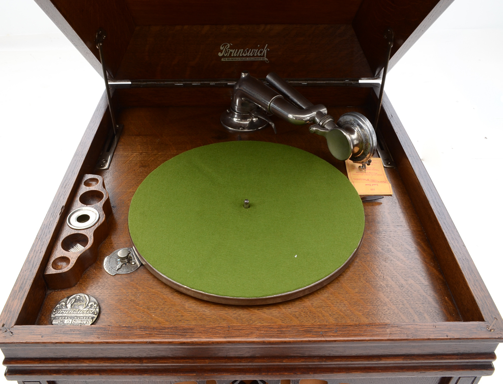 Brunswick Model 210 Oak Phonograph with Records | EBTH
