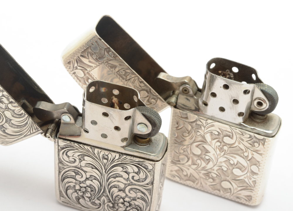 Four Sterling and 800 Silver Lighters | EBTH