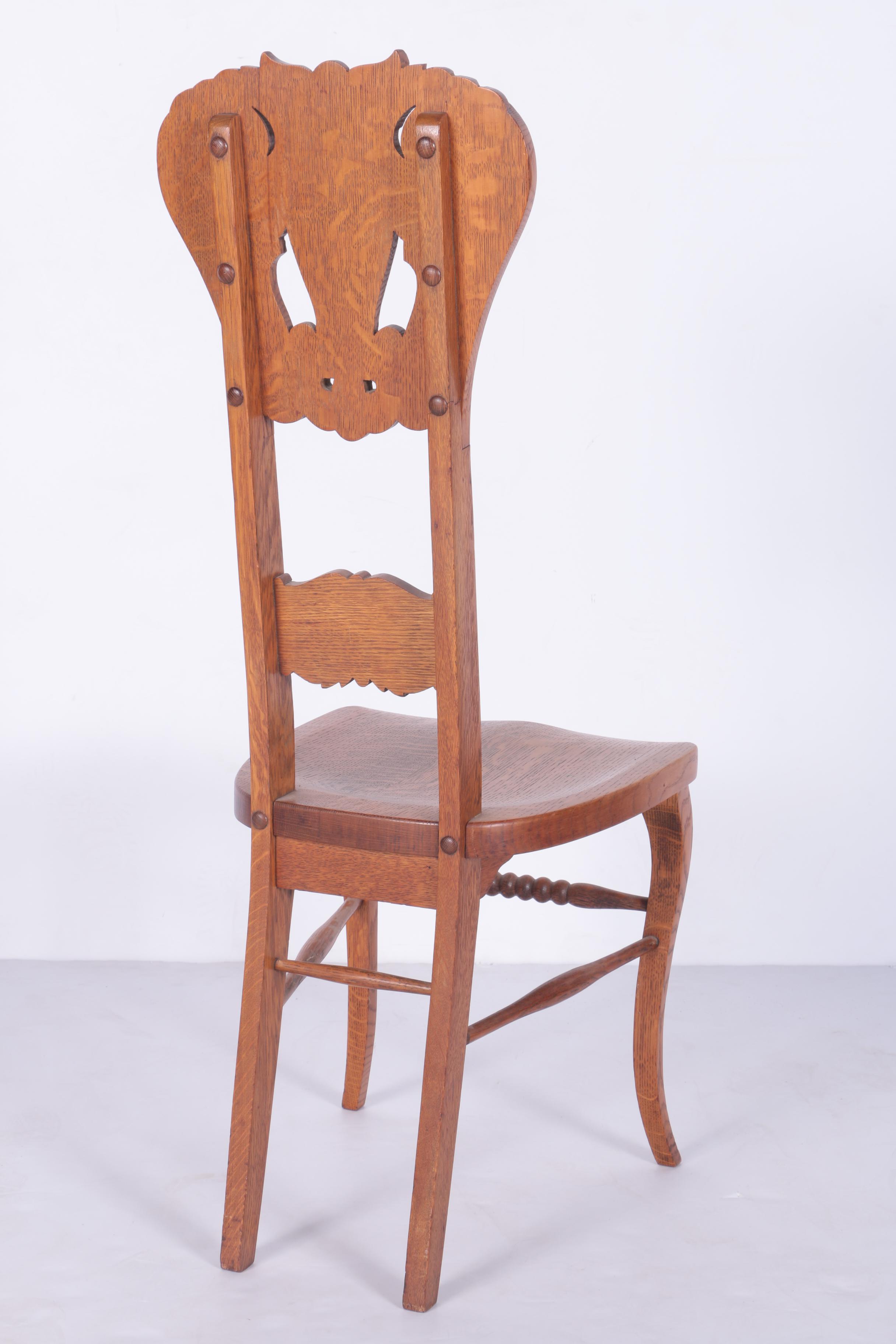 North Wind Carved Oak Chair | EBTH
