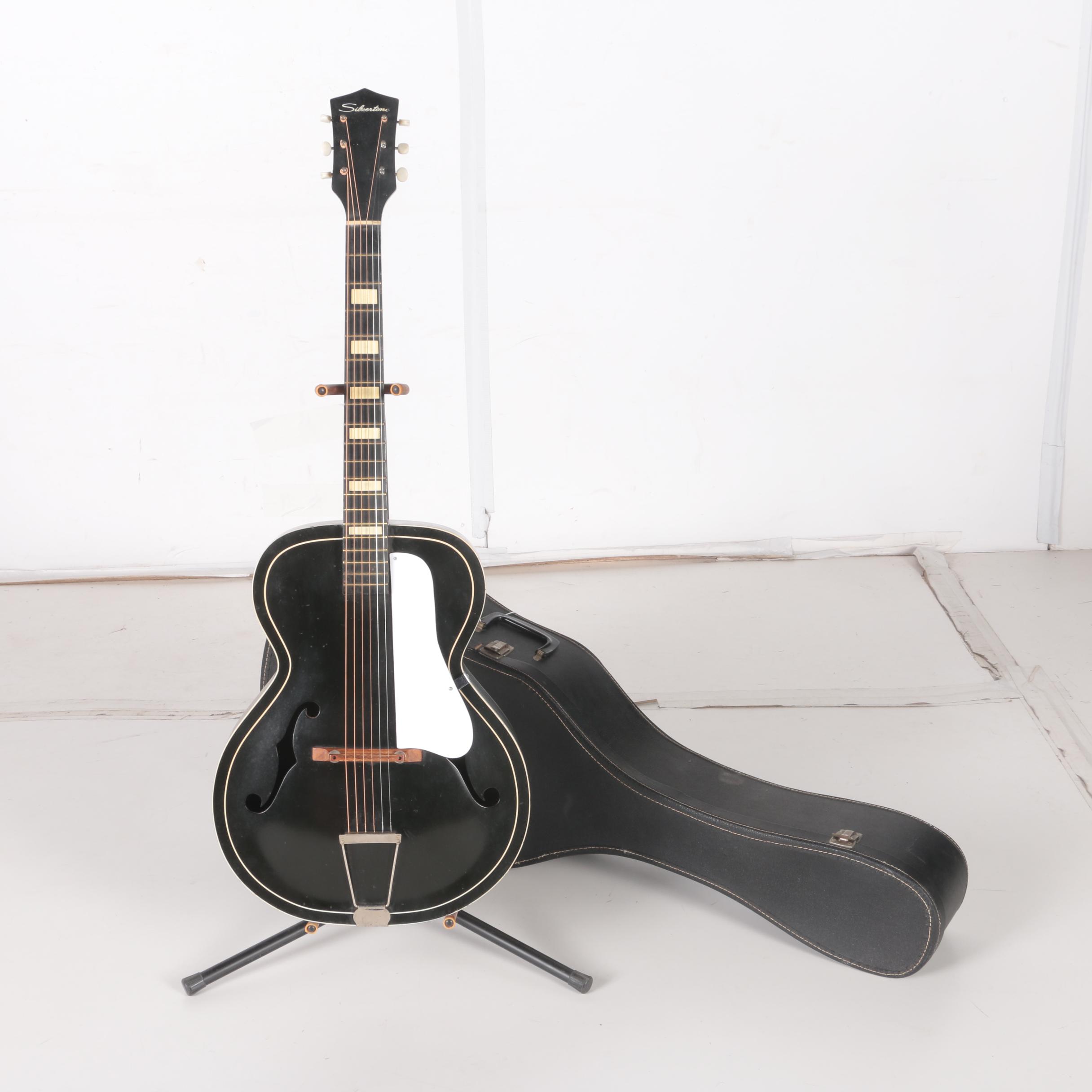 1960s Silvertone Tuxedo Archtop Guitar and Case | EBTH