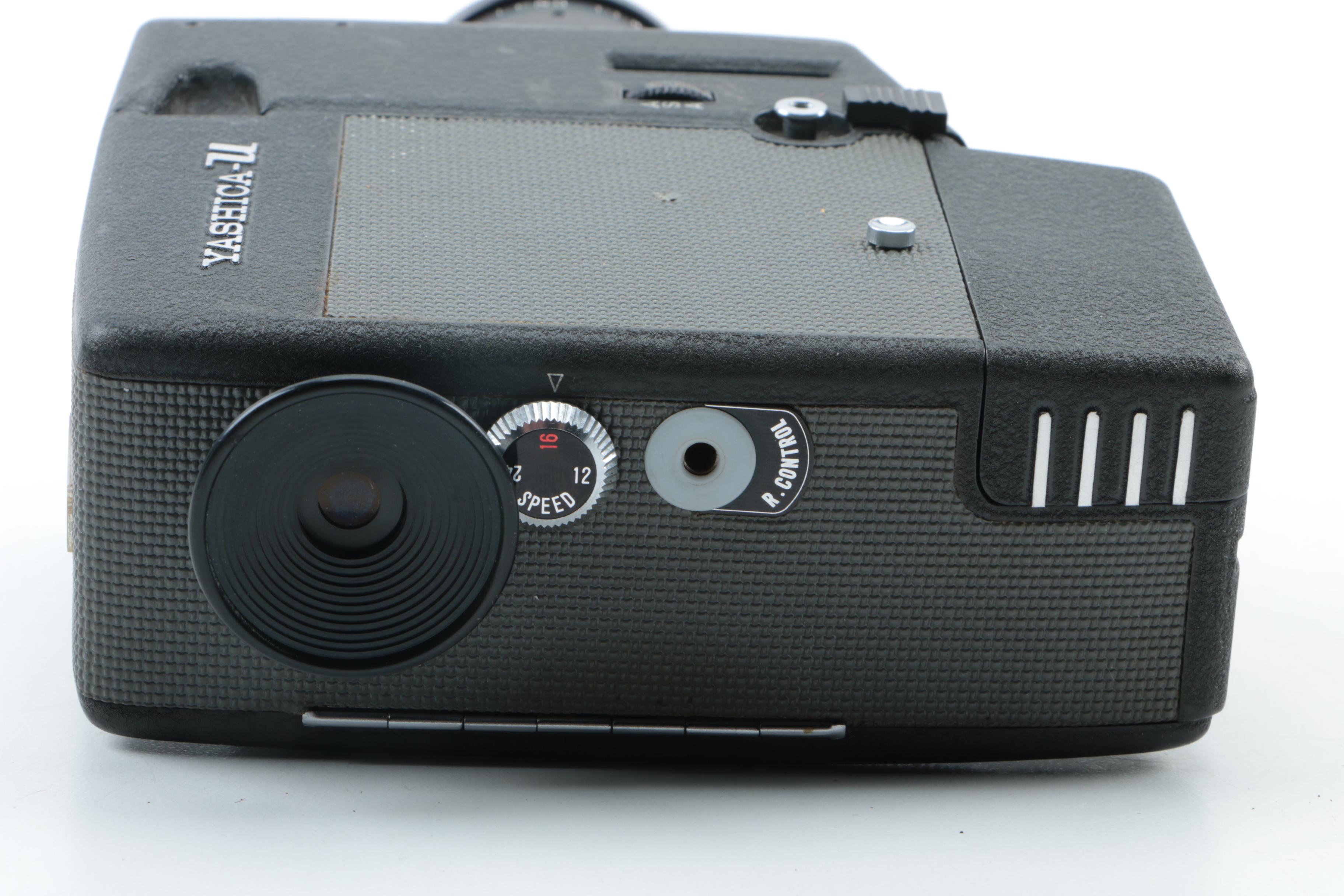 Vintage Yashica U-Matic 8mm Movie Camera with Accessories | EBTH