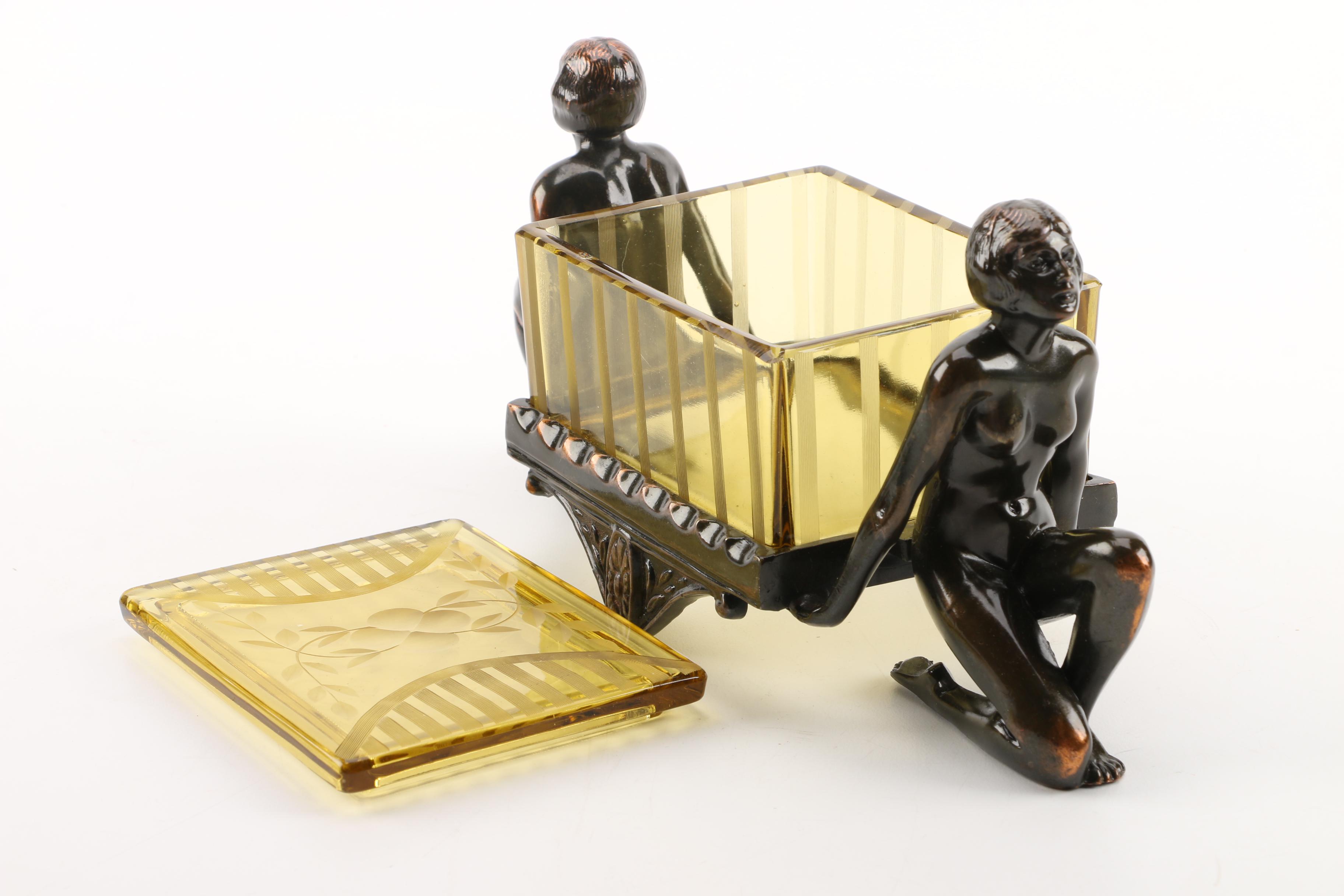 1930s Art Deco Spelter and Glass Cigarette Box with Figural Supports | EBTH