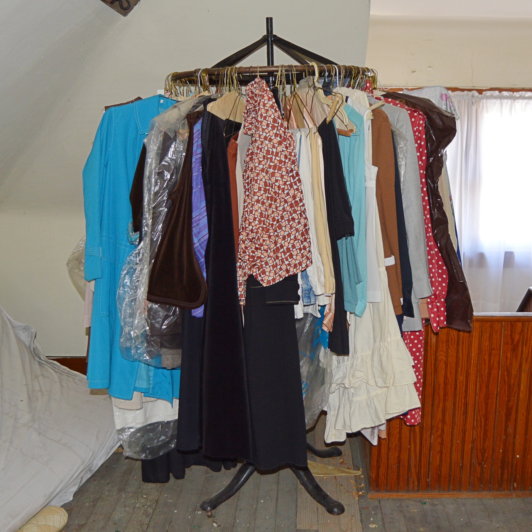 Vintage Iron Revolving Clothing Rack with Vintage Clothes Collection | EBTH