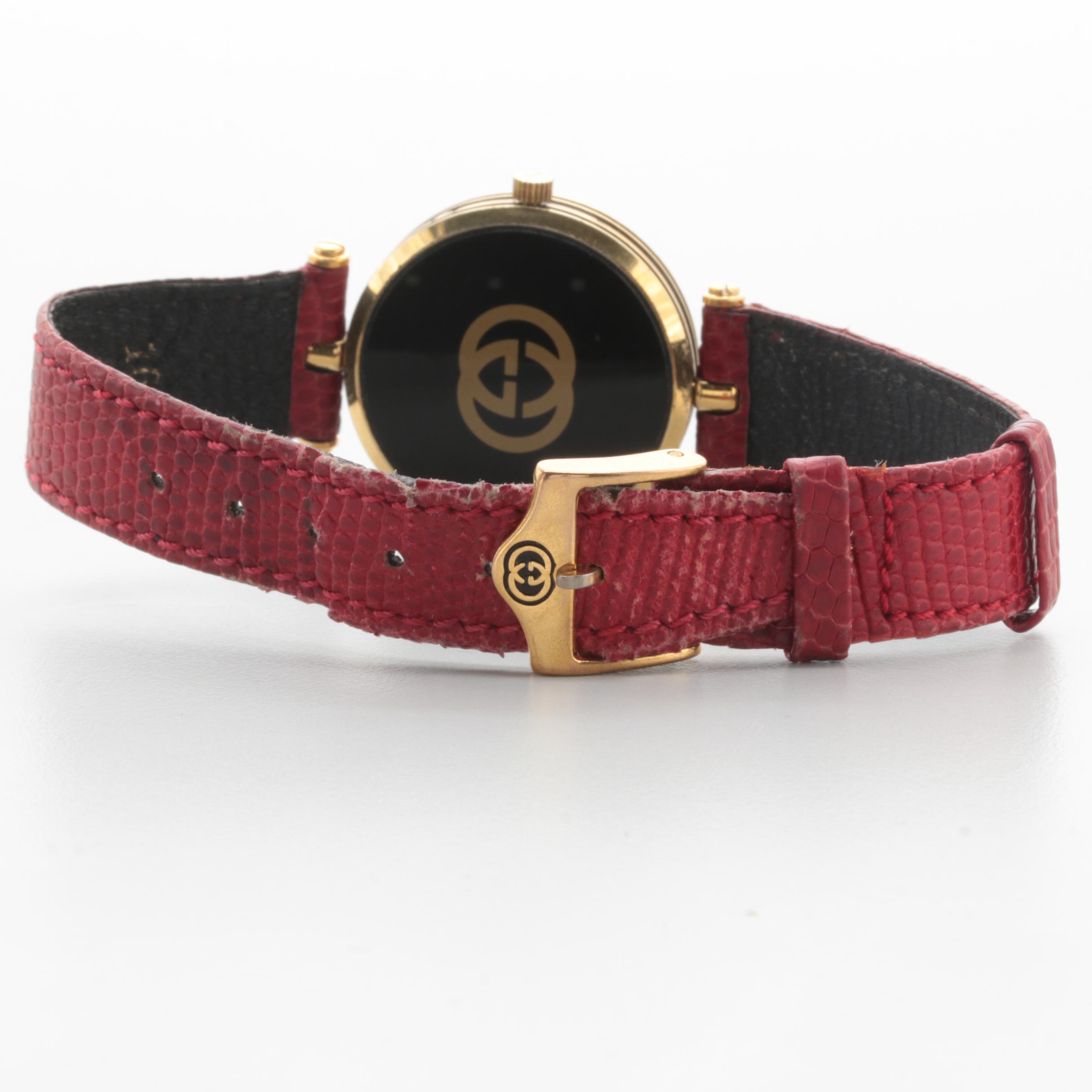 Gucci Gold Tone and Enameled Red Leather Strap Wristwatch | EBTH