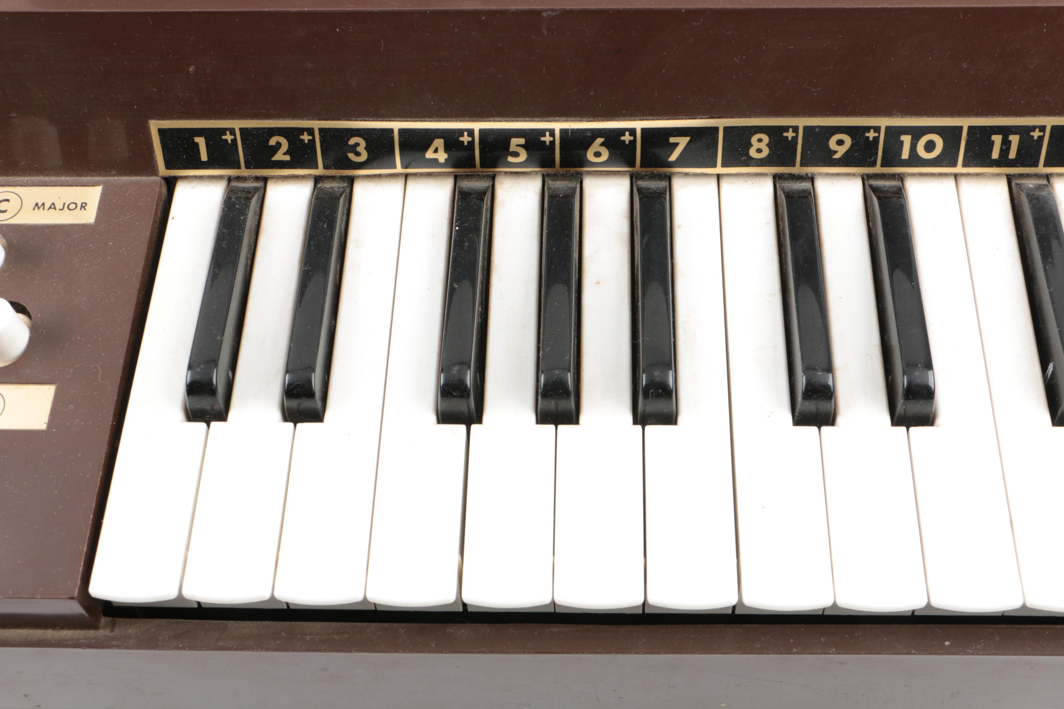 Vintage Magnus Table Top Electric Chord Toy Organ | EBTH