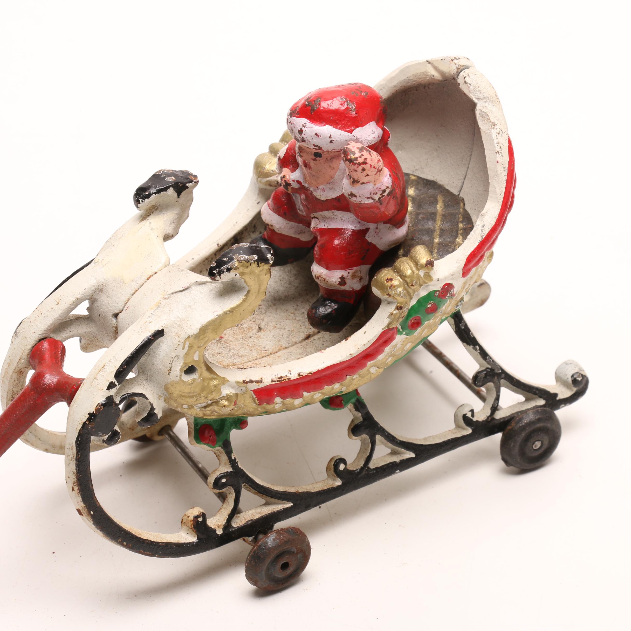 Reproduction Cast Iron Santa Claus, Sleigh and Reindeer | EBTH