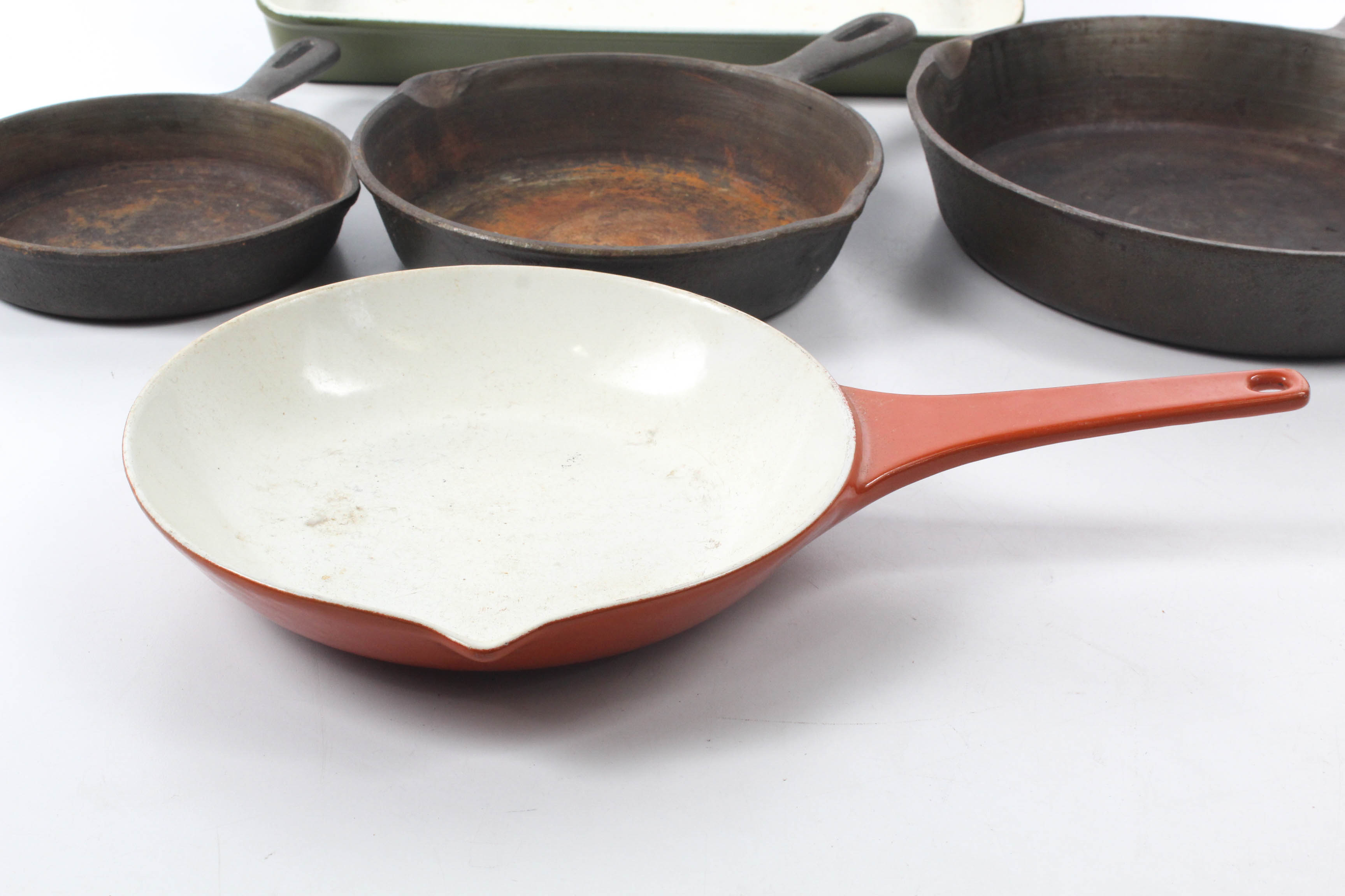 Enameled and Raw Cast Iron Cookware, Mid Century | EBTH