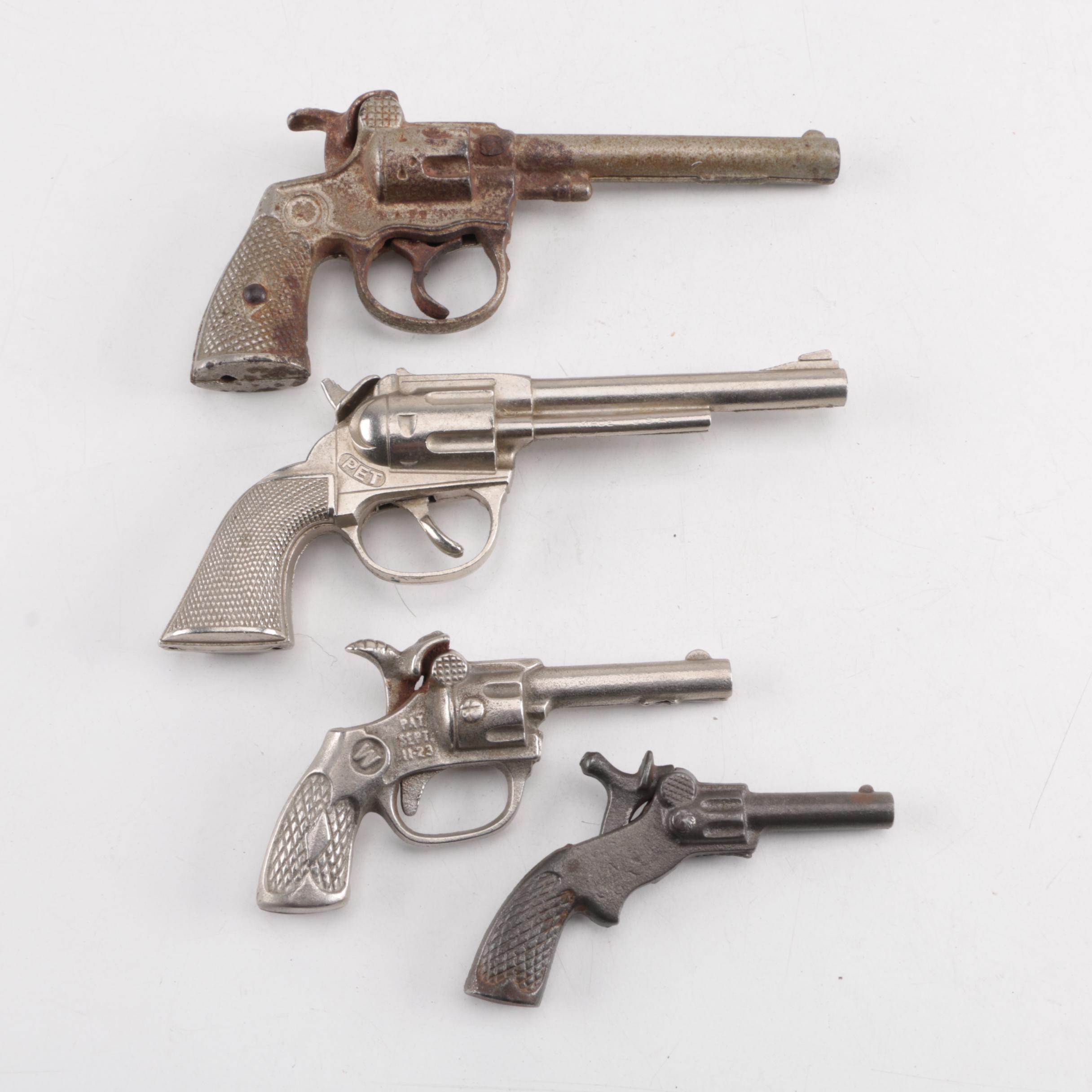 "Pluck", "Pet", "Bronco" and "Jax" Cast Iron Toy Revolvers, Mid-Century ...