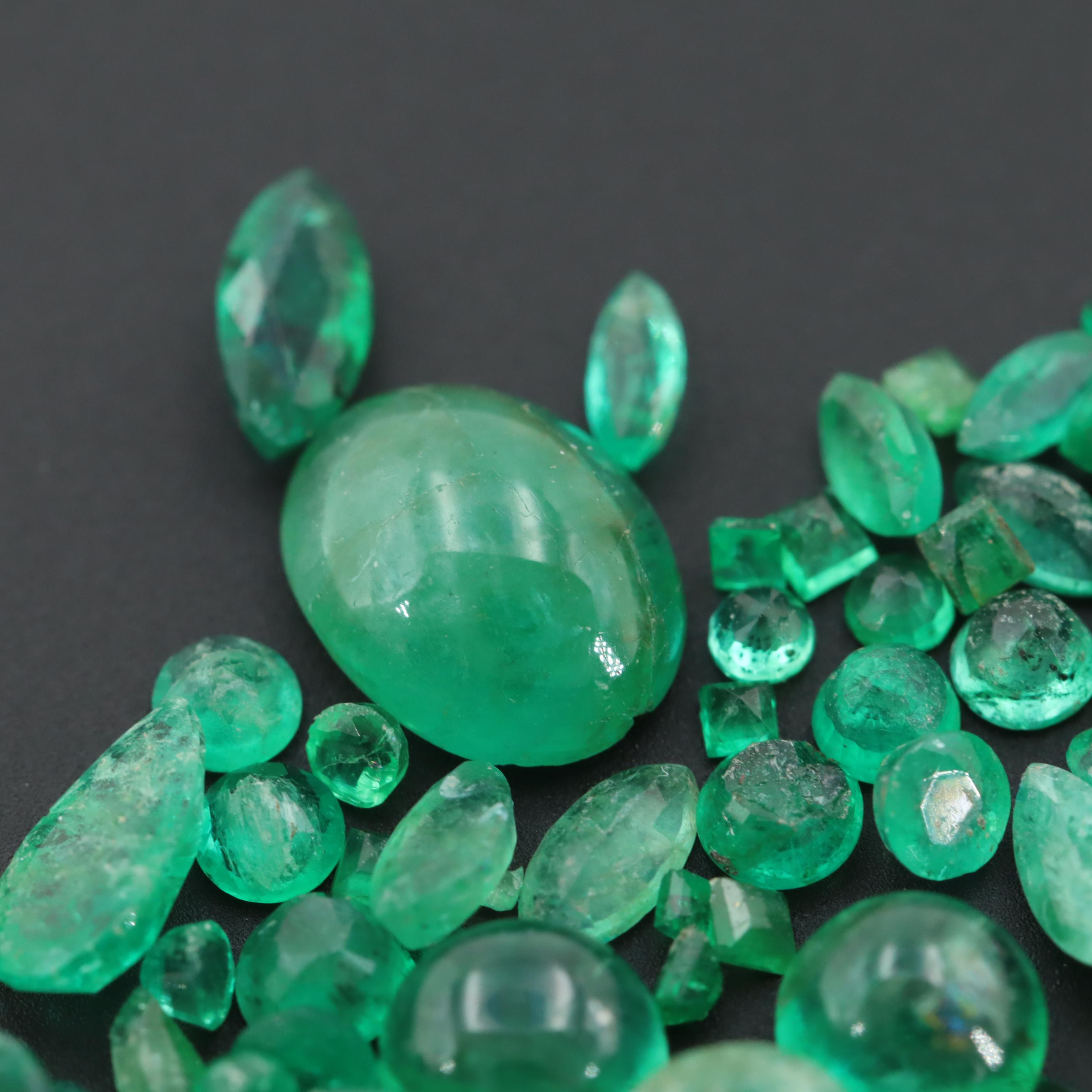 Loose 23.86 CTW Mixed Cut Emerald Gemstones | EBTH