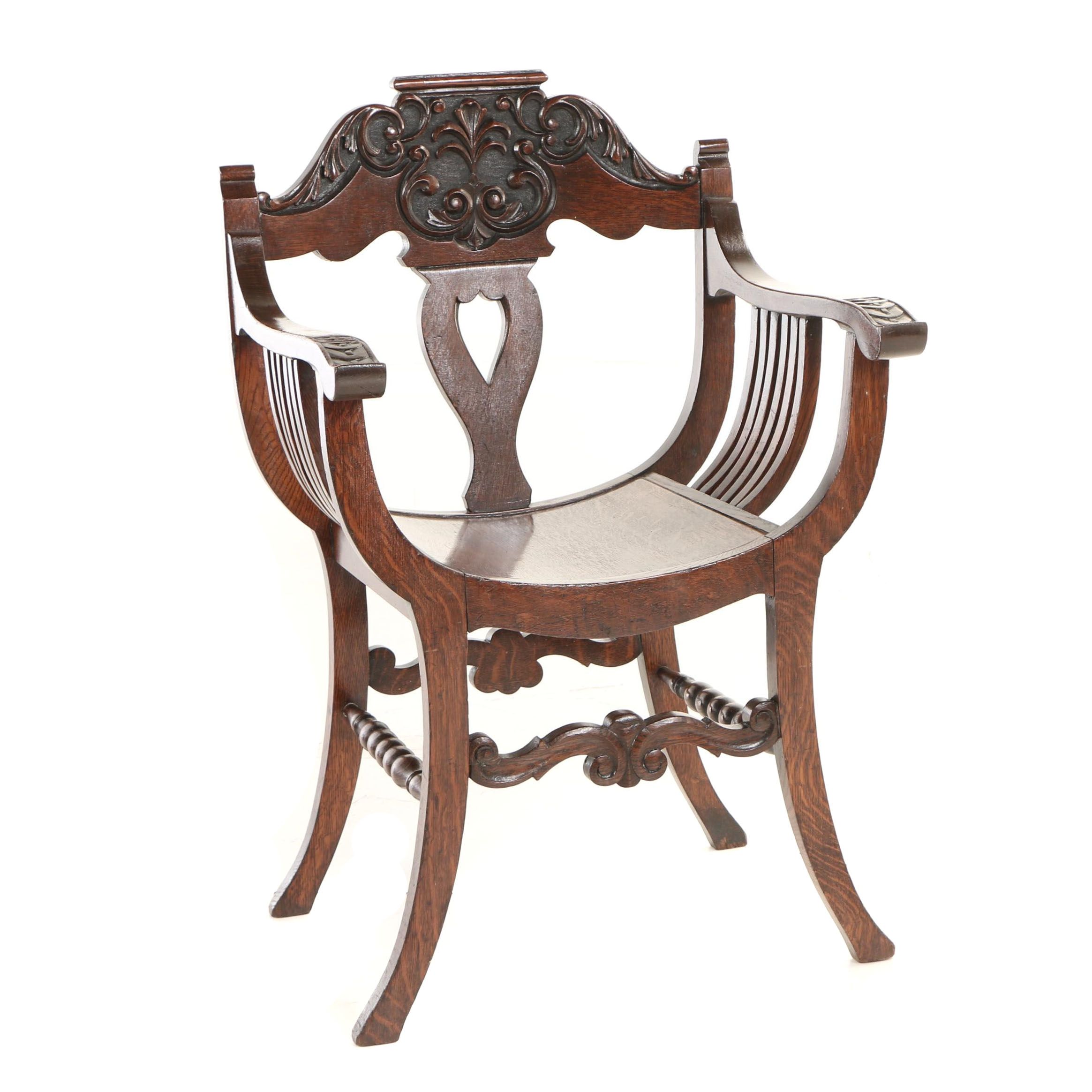 The Stomps Burkhardt Co., Late Victorian Carved Oak Savonarola Chair | EBTH