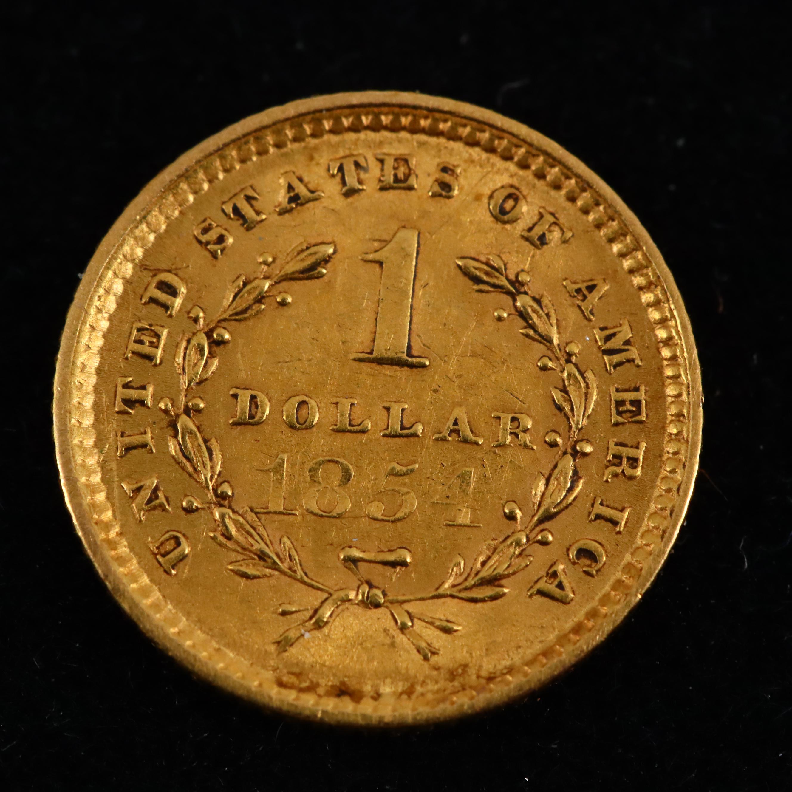 1854 Liberty Head $1 Gold Coin | EBTH