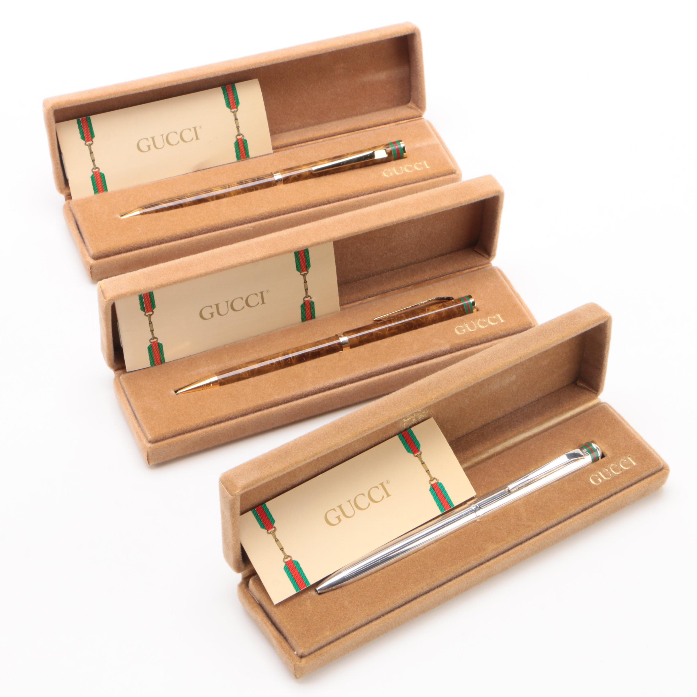 Gucci Ballpoint Pen and Marbled Resin Mechanical Pencils | EBTH