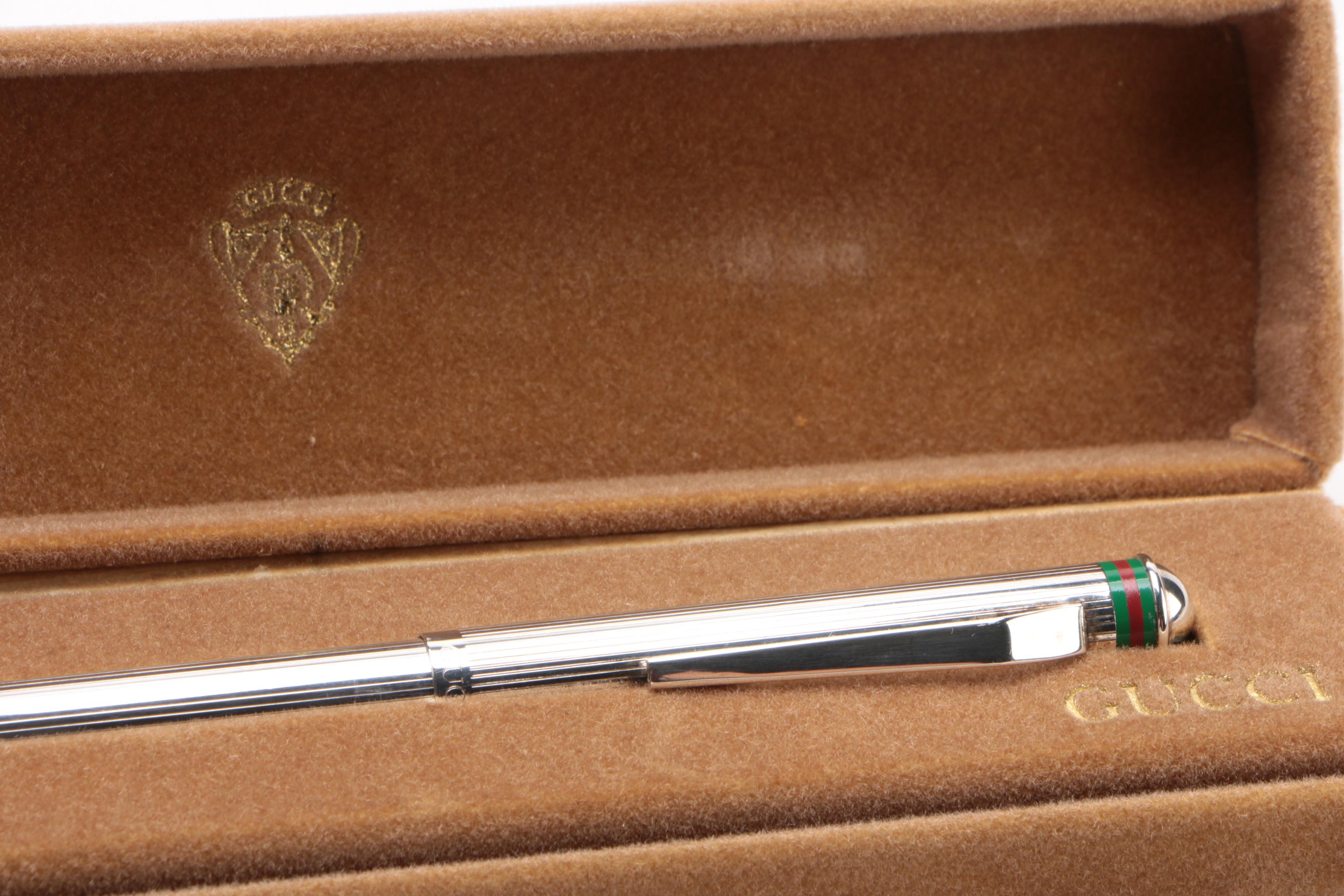 Gucci Ballpoint Pen and Marbled Resin Mechanical Pencils | EBTH