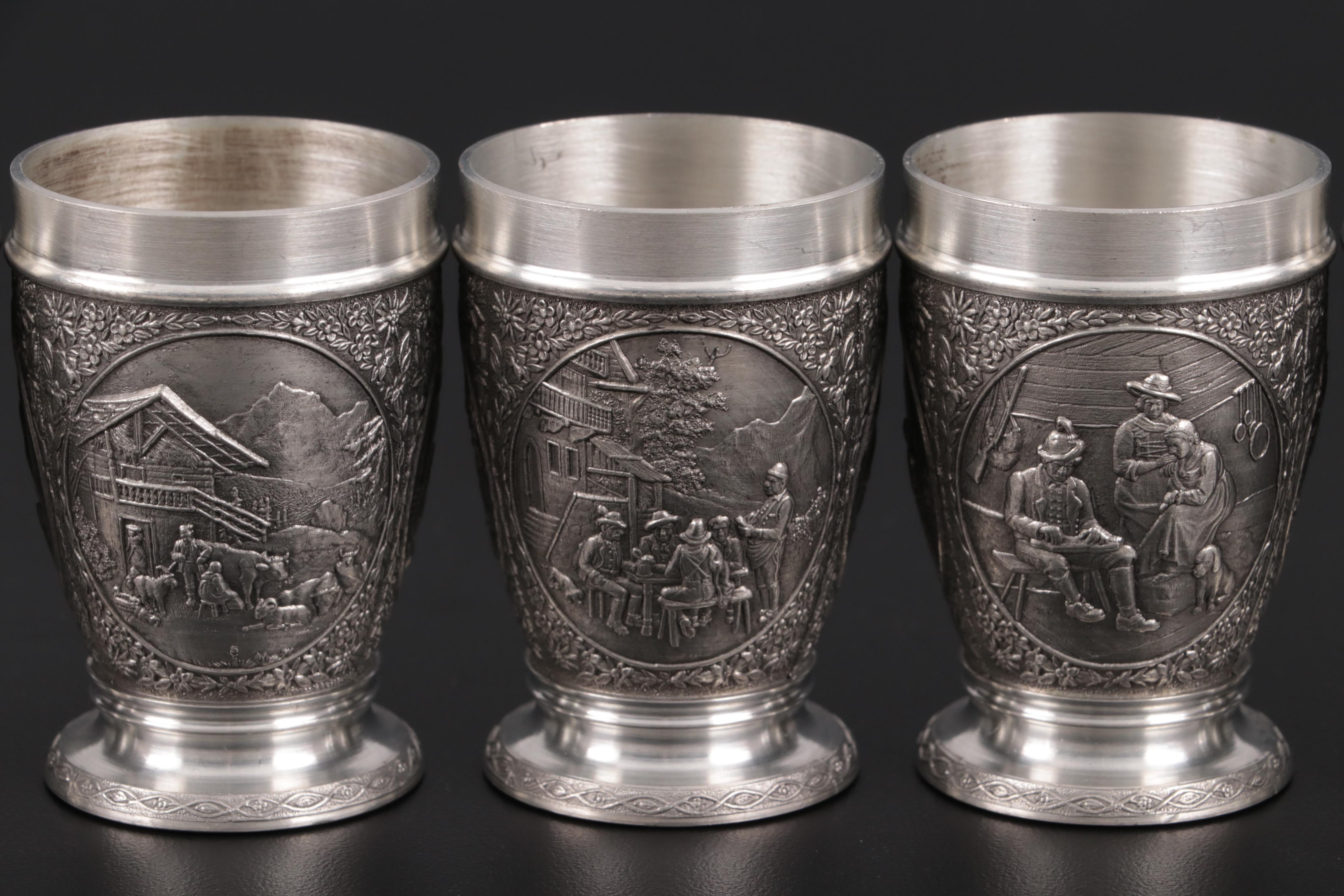 Zinn-Becker German Pewter Shot Glasses with Relief Scenes | EBTH