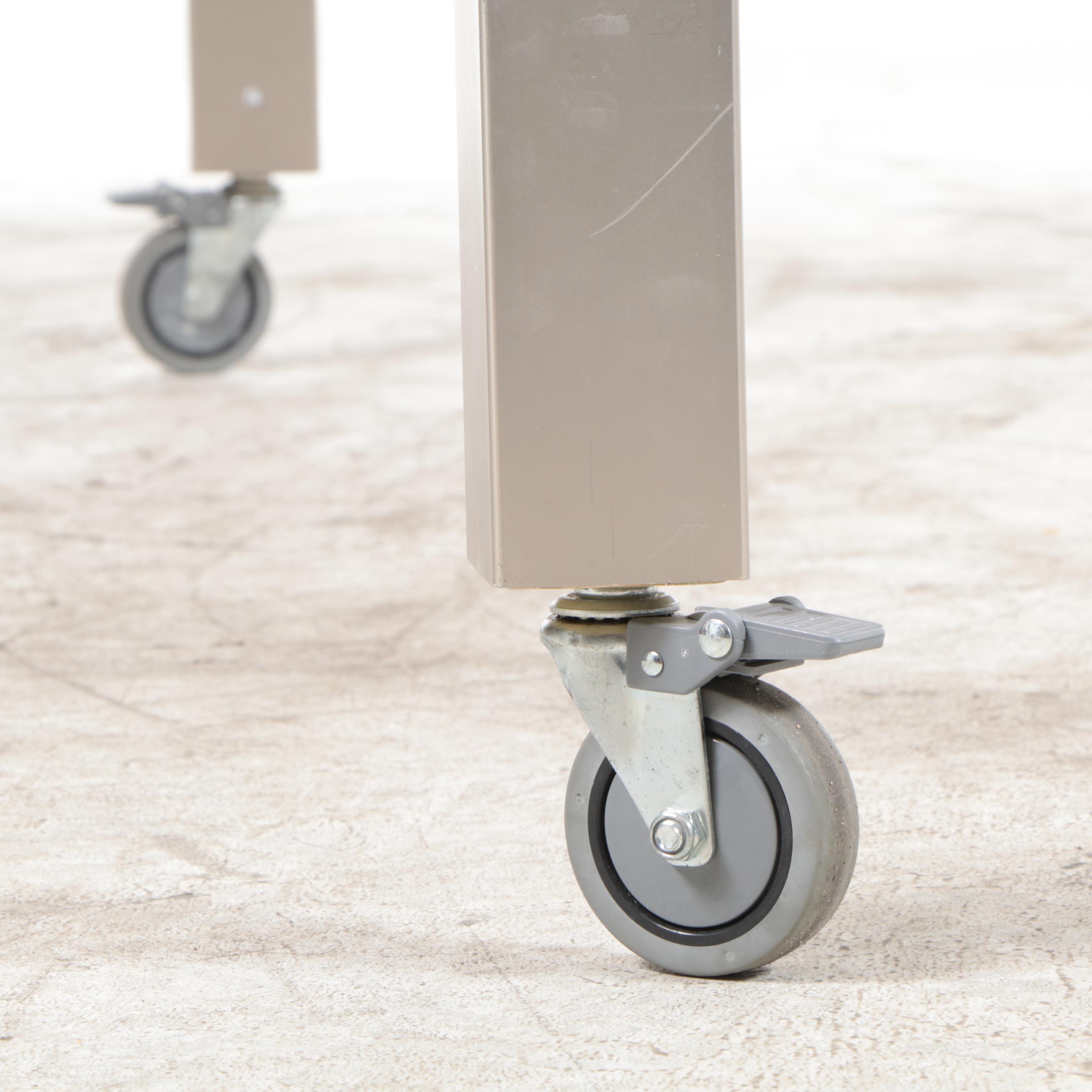 Modernist Style Computer Desk on Large Casters | EBTH