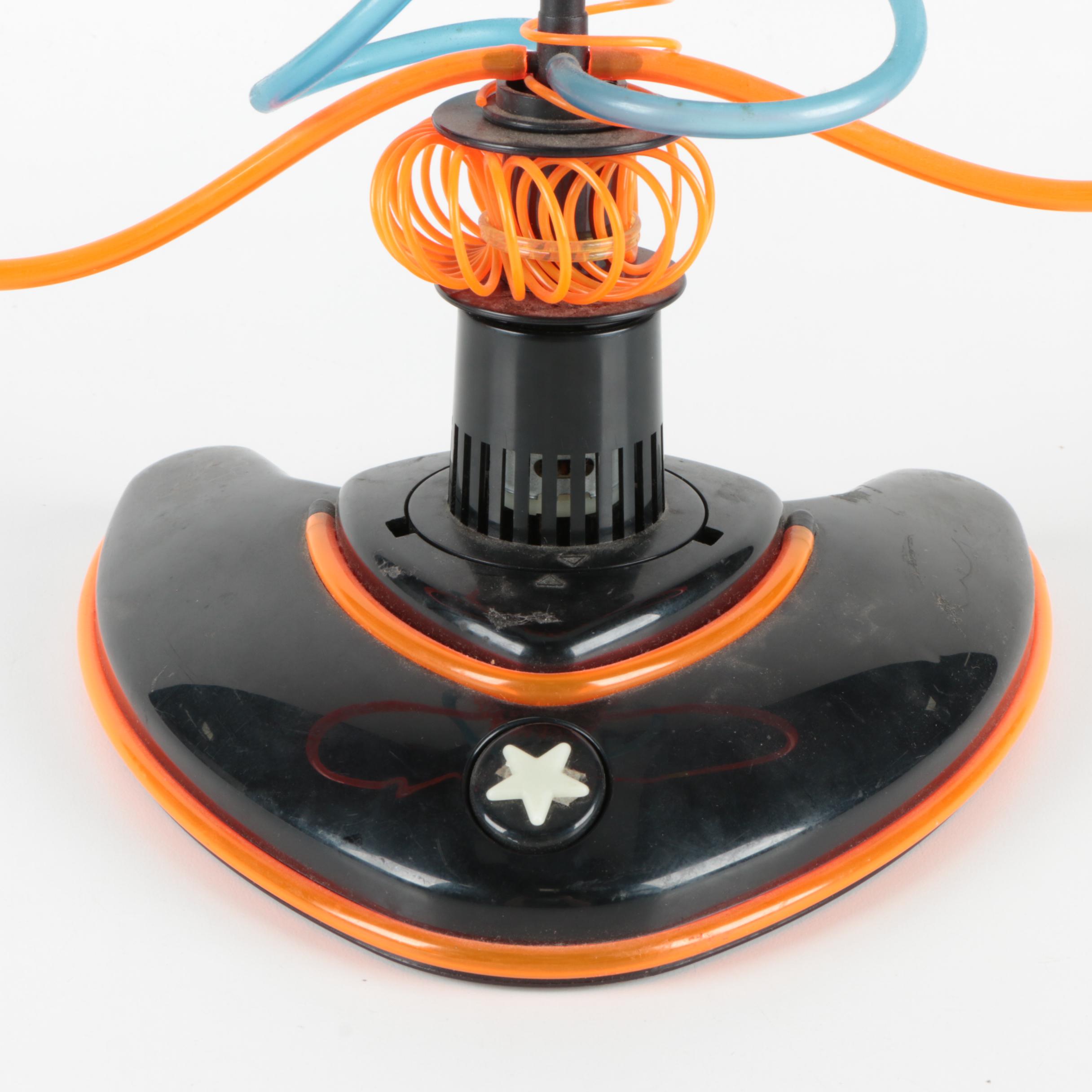 Planet Time Blacklight Reactive Spintrix Toy | EBTH